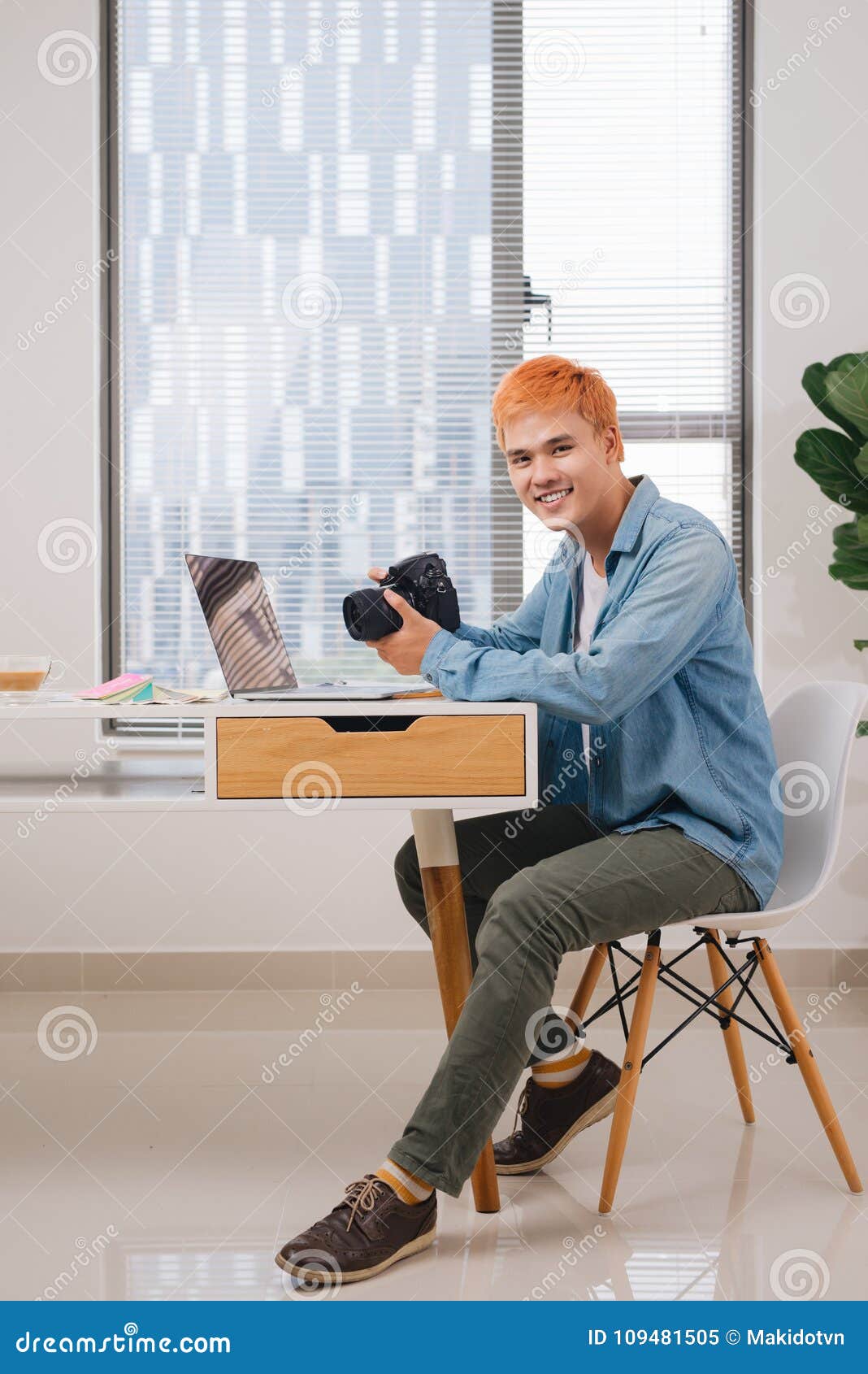 Photographer Working at Desk in Modern Office Stock Image - Image of ...