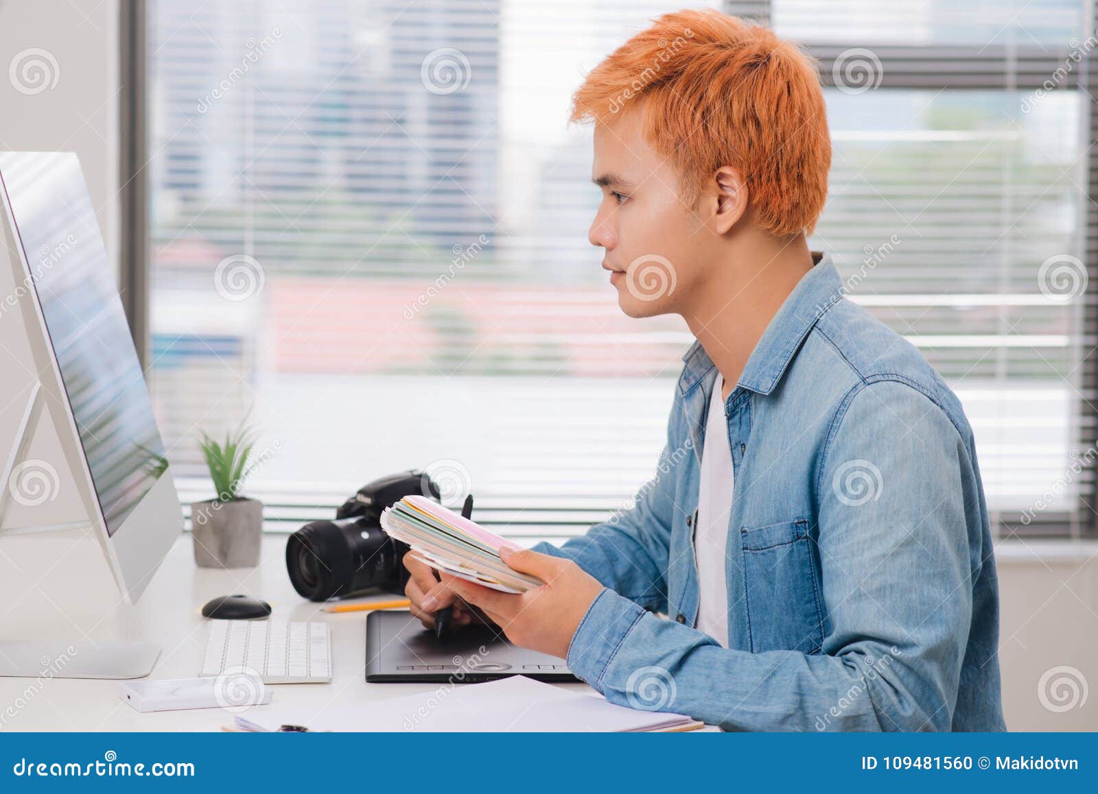 Photographer Working at Desk in Modern Office Stock Photo - Image of ...