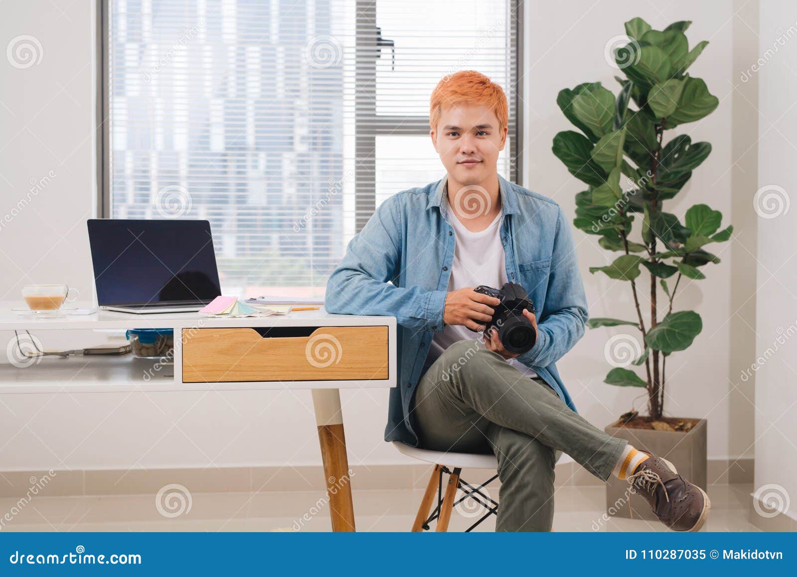 Photographer Working at Desk in Modern Office Stock Image - Image of ...