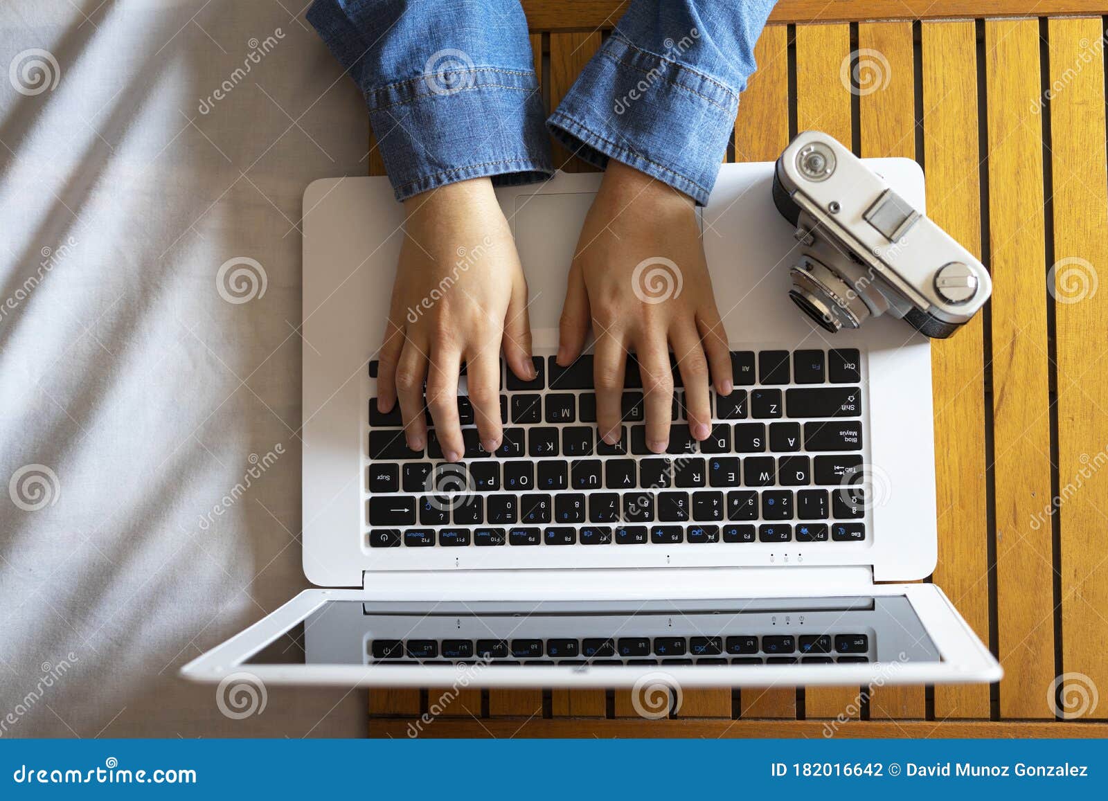 Photographer Working from Home with Her Computer and Camera. Stock ...