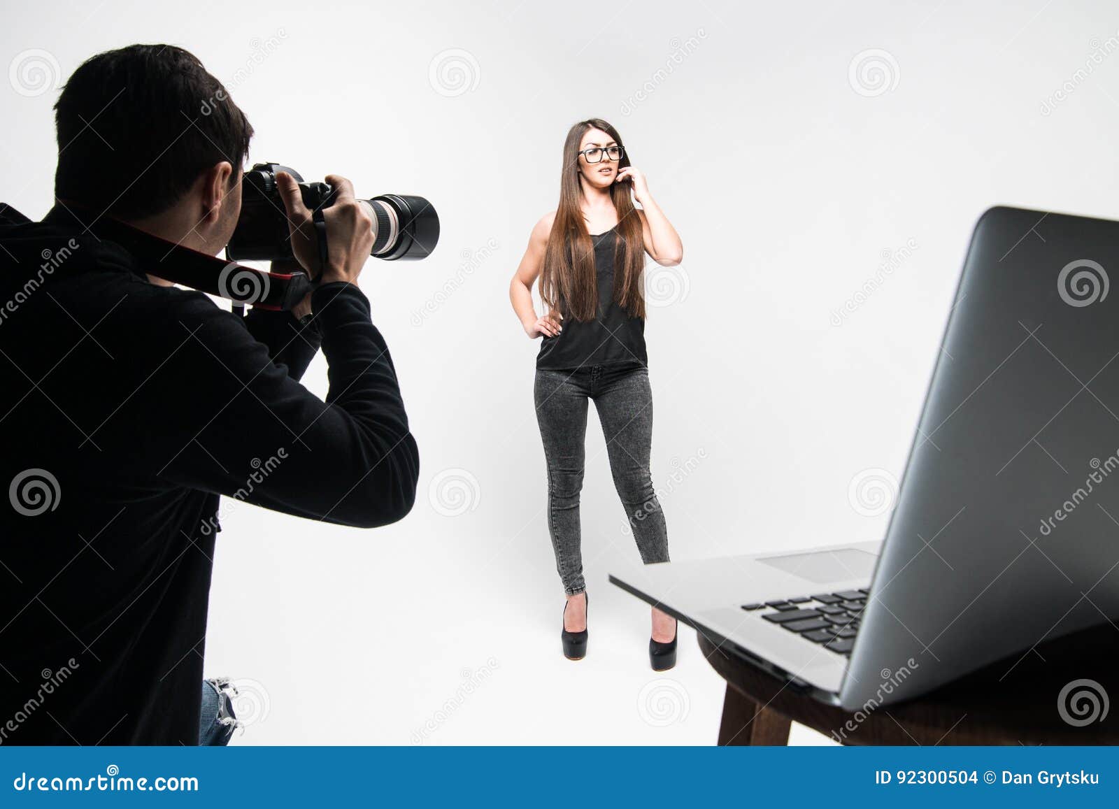 Photographer Working with Model in Equipped White Studio Stock Photo ...