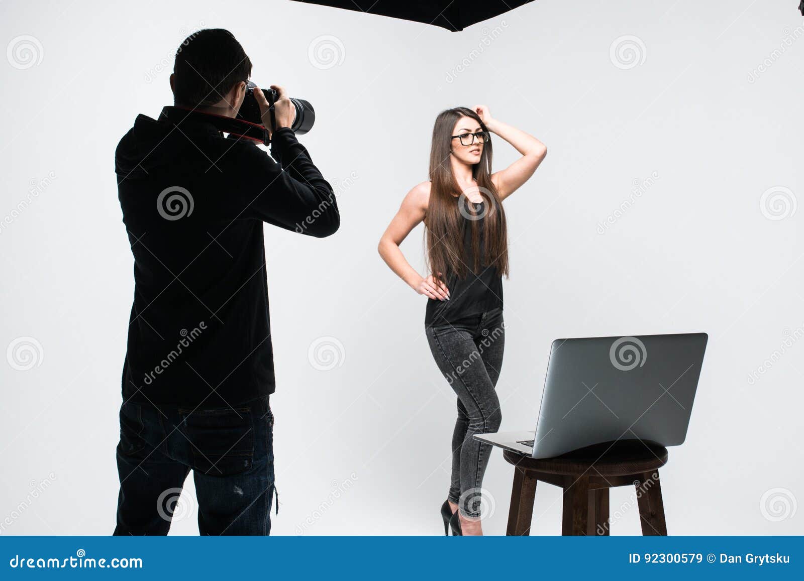 Photographer Working with Model in Equipped White Studio Stock Image ...