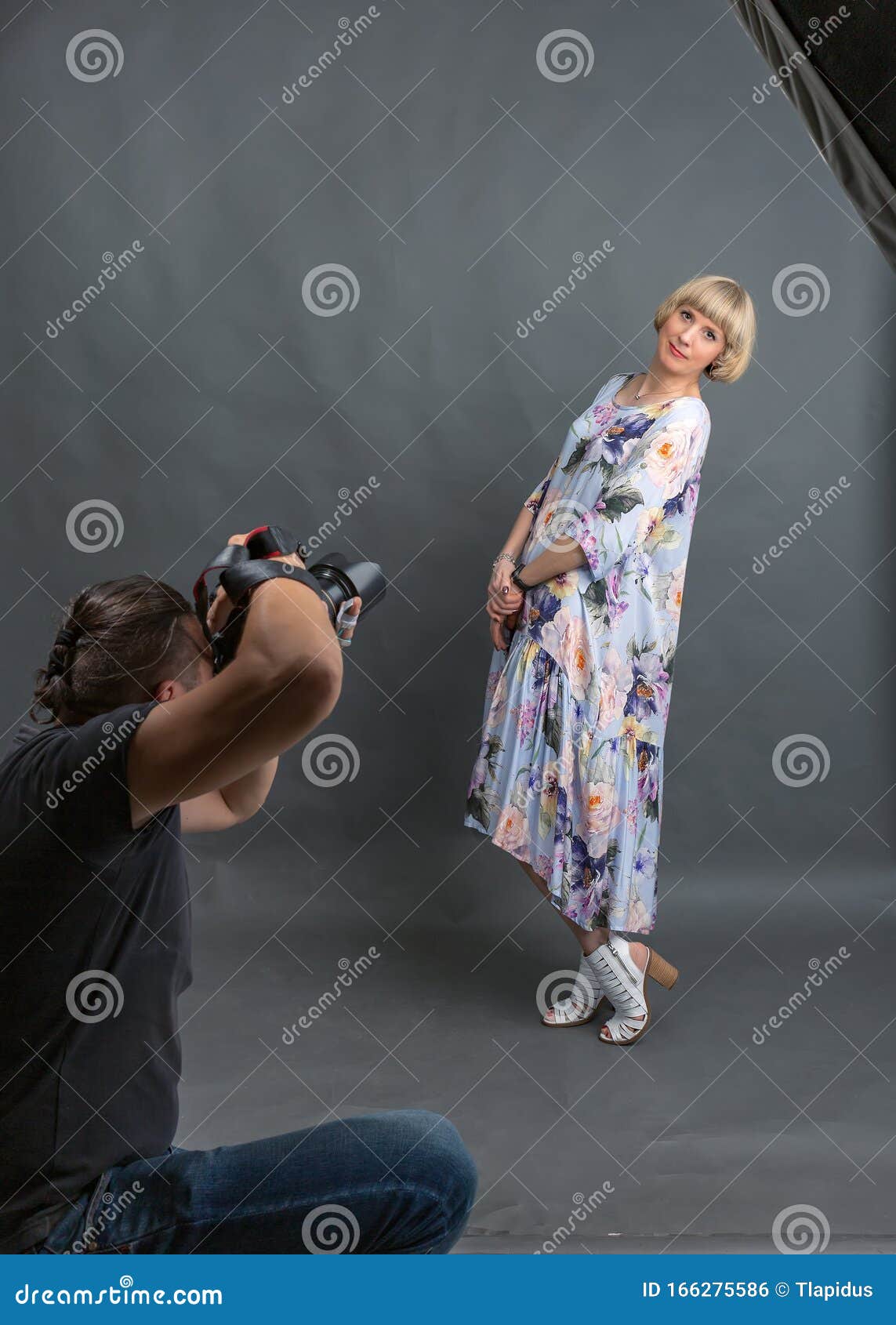 Photographer Works with a Client in the Studio Stock Photo - Image of ...
