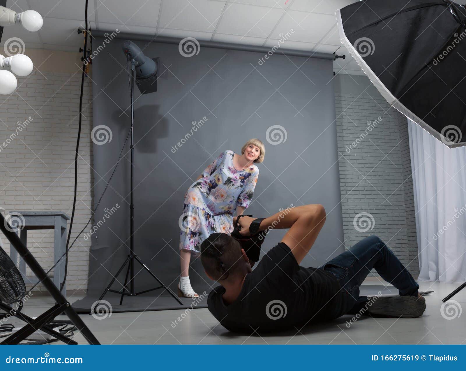 Photographer Works with a Client in the Studio Stock Image - Image of ...