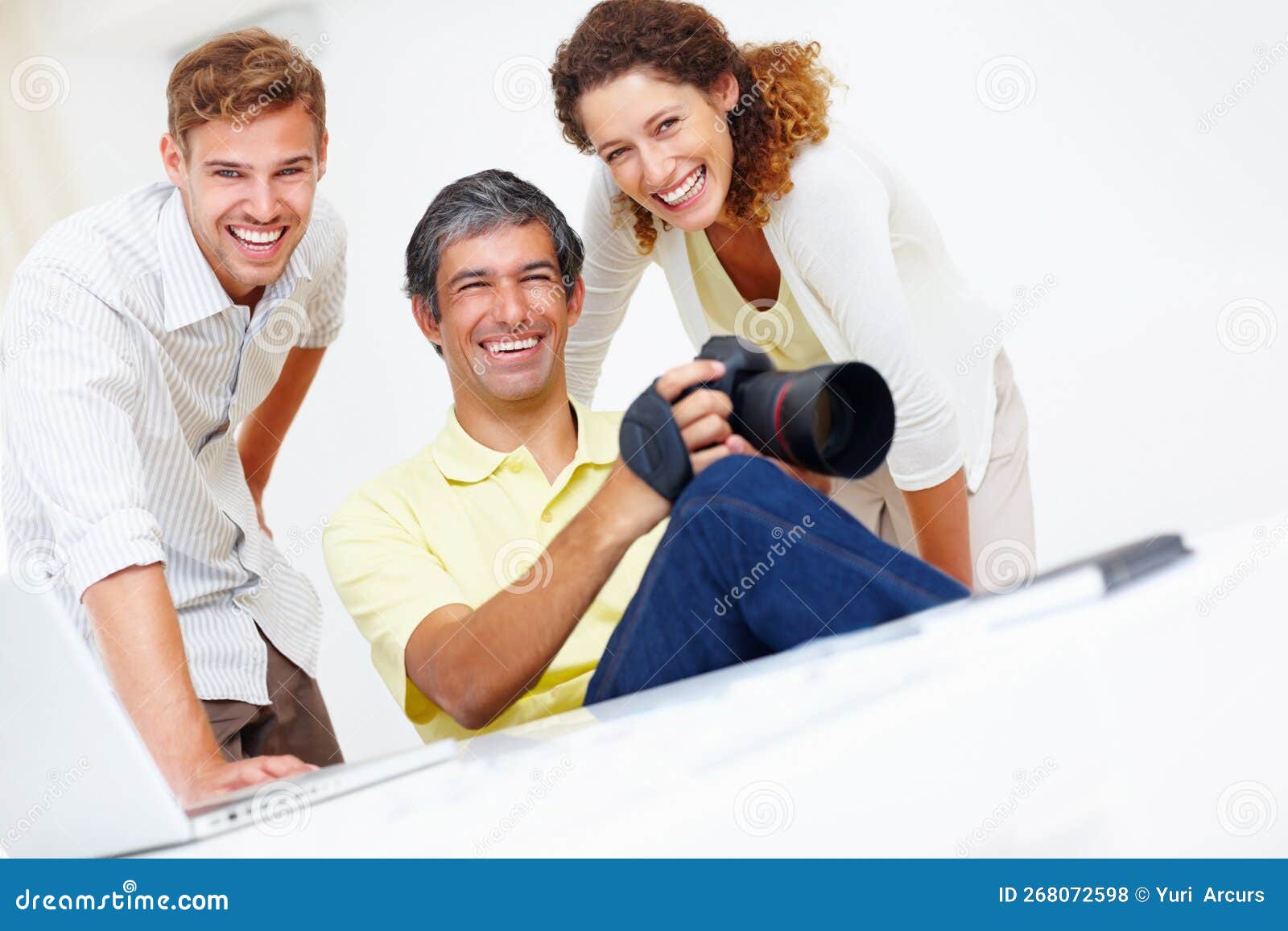 Photographers Smiling. Portrait of Three Professional Photographers ...