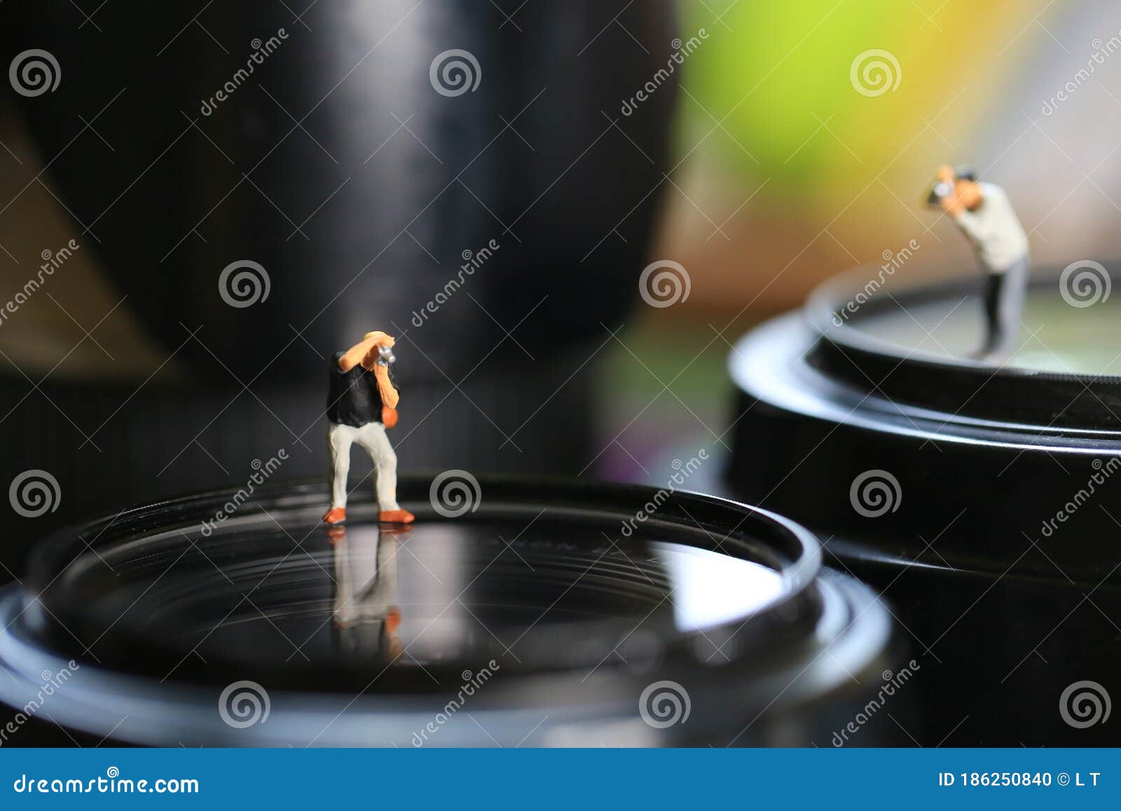 Photographers Tiny Man in Front of the Cam Stock Photo - Image of lying ...