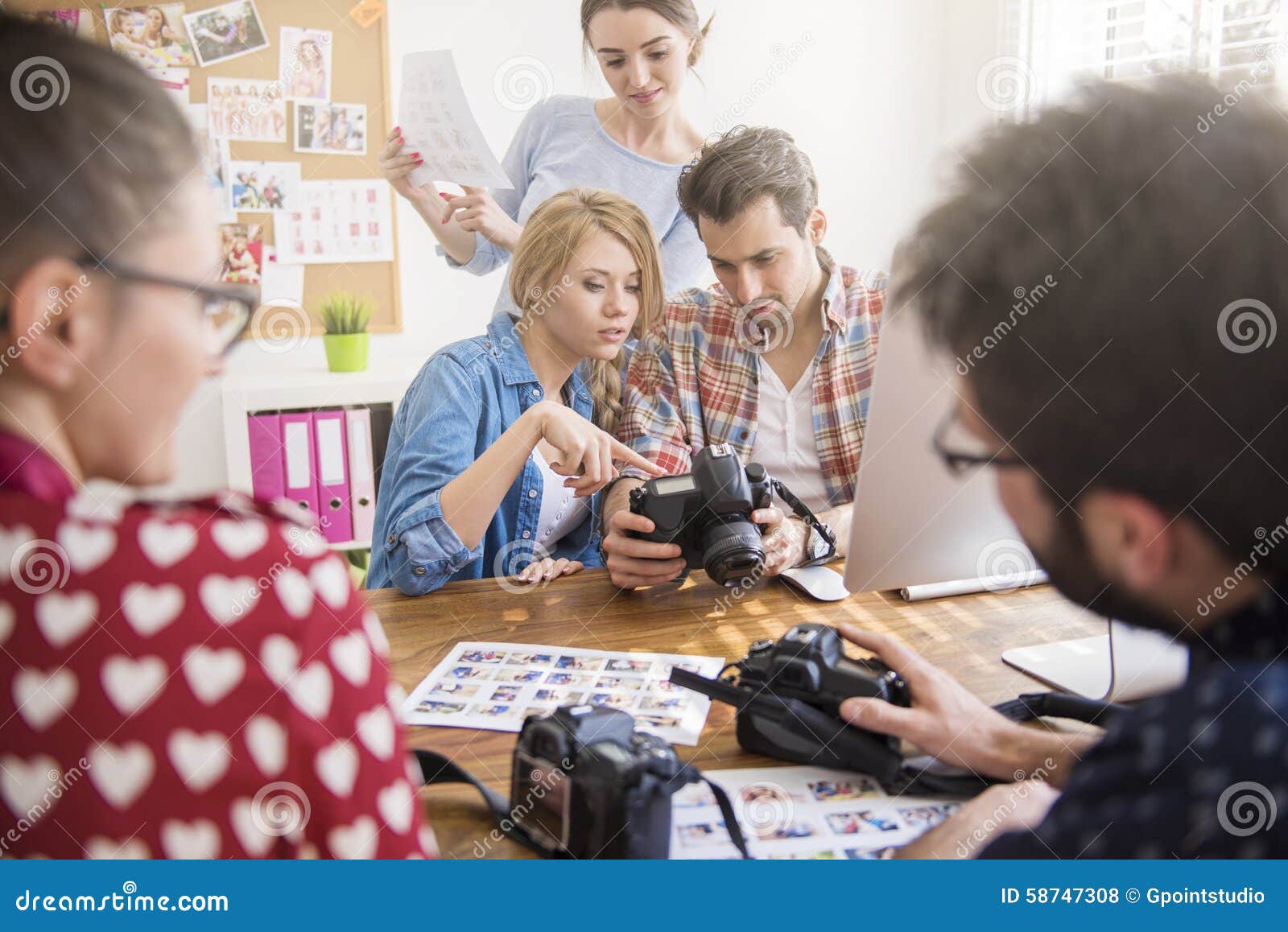 Photographers at work stock photo. Image of expertise - 58747308