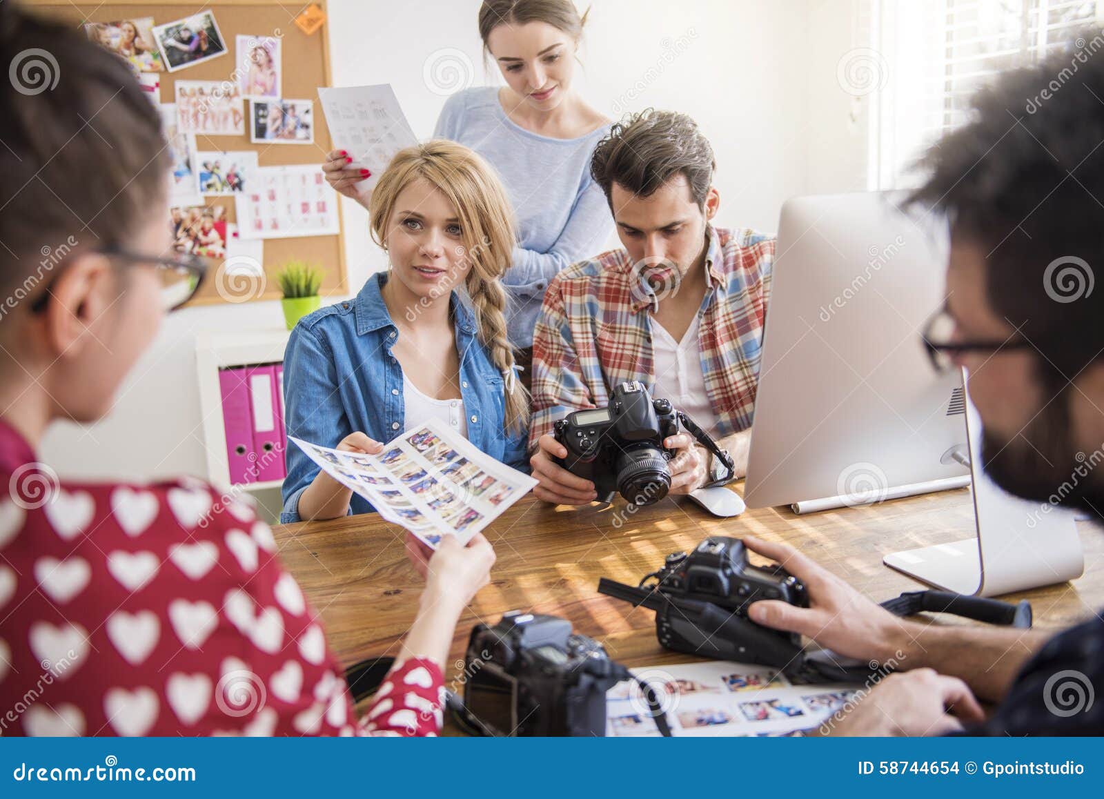 Photographers at work stock photo. Image of computer - 58744654