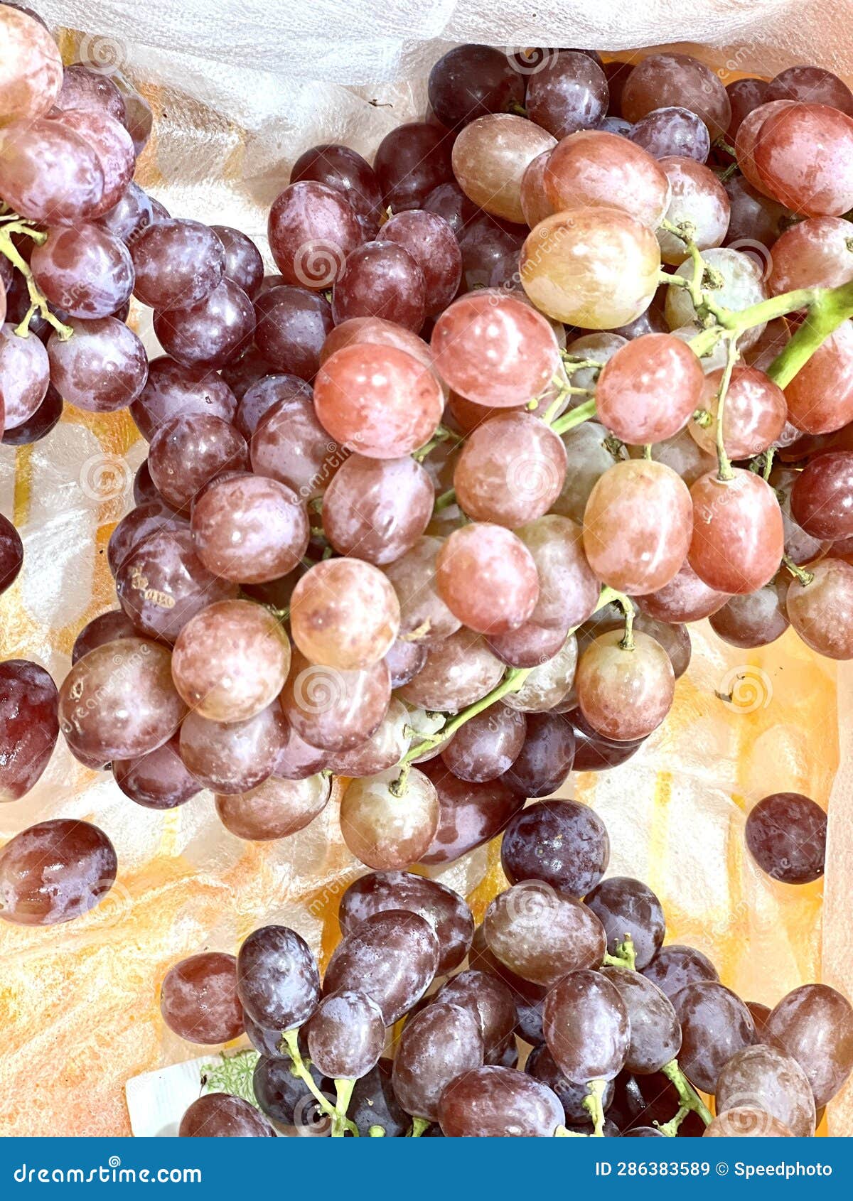 A Photography of a Bunch of Grapes on a Table, There are Many Grapes ...