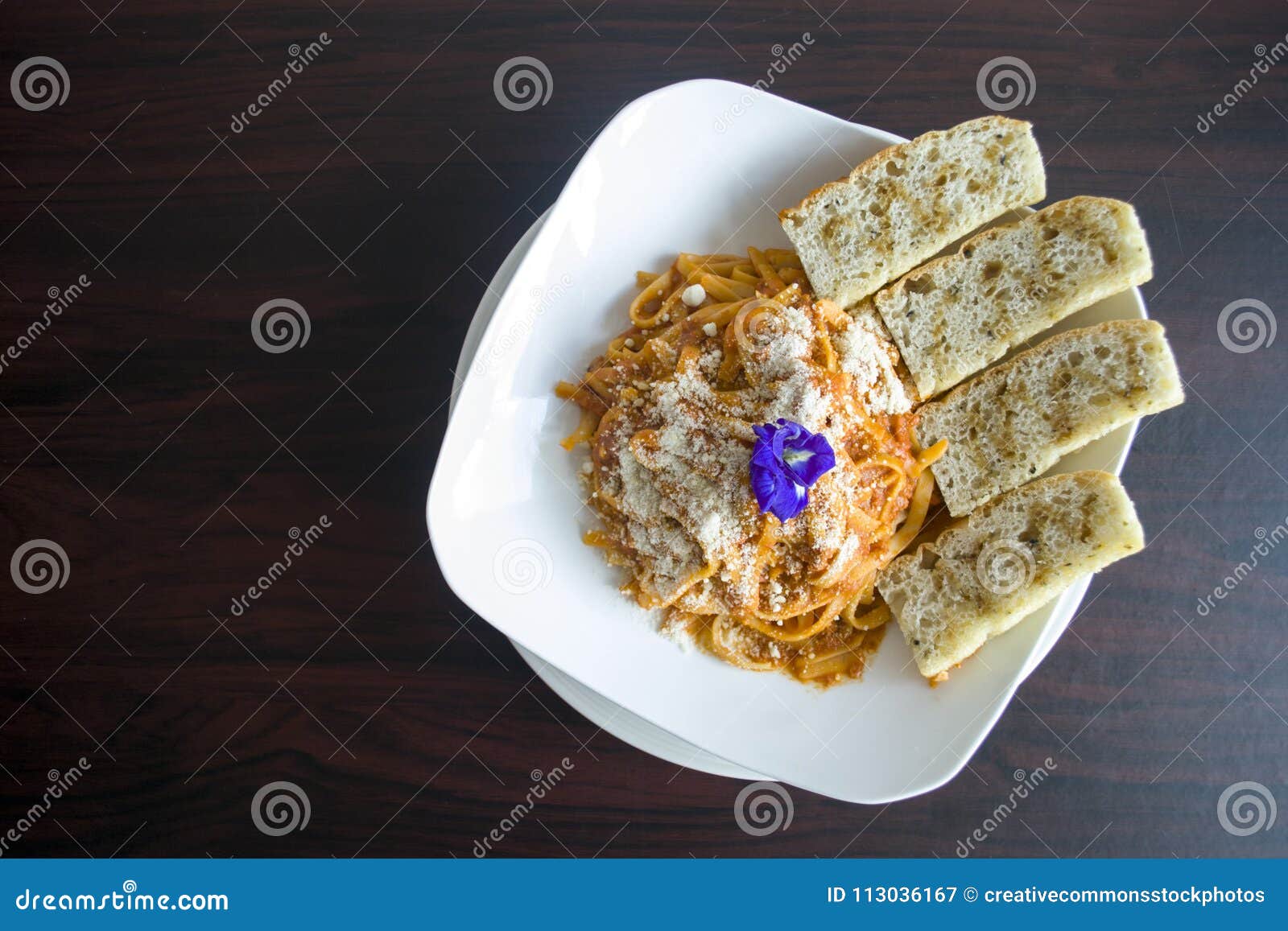 Photography Of Pasta With Garlic Bread Picture. Image: 113036167