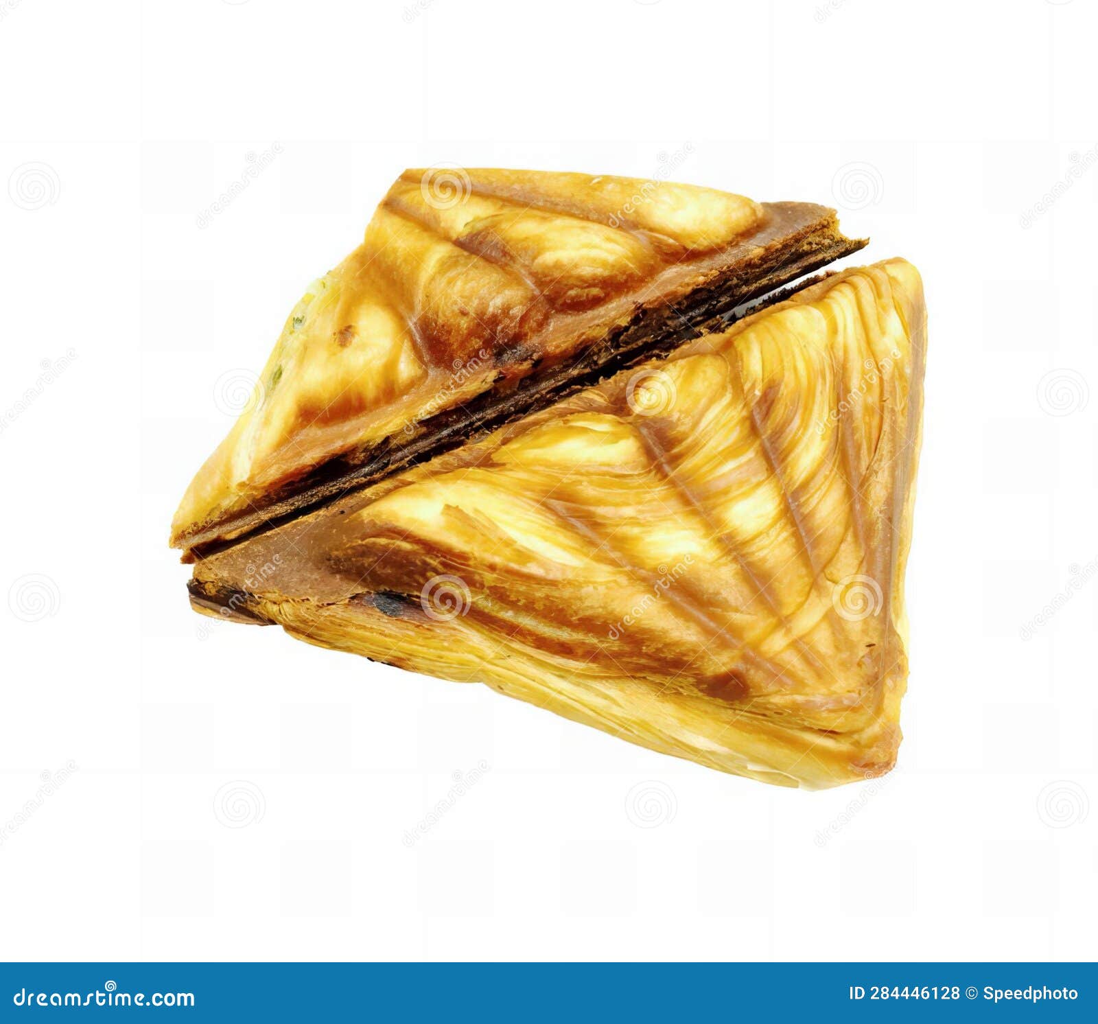 A Photography of a Pastry with a Piece Cut in Half, There is a Piece of ...