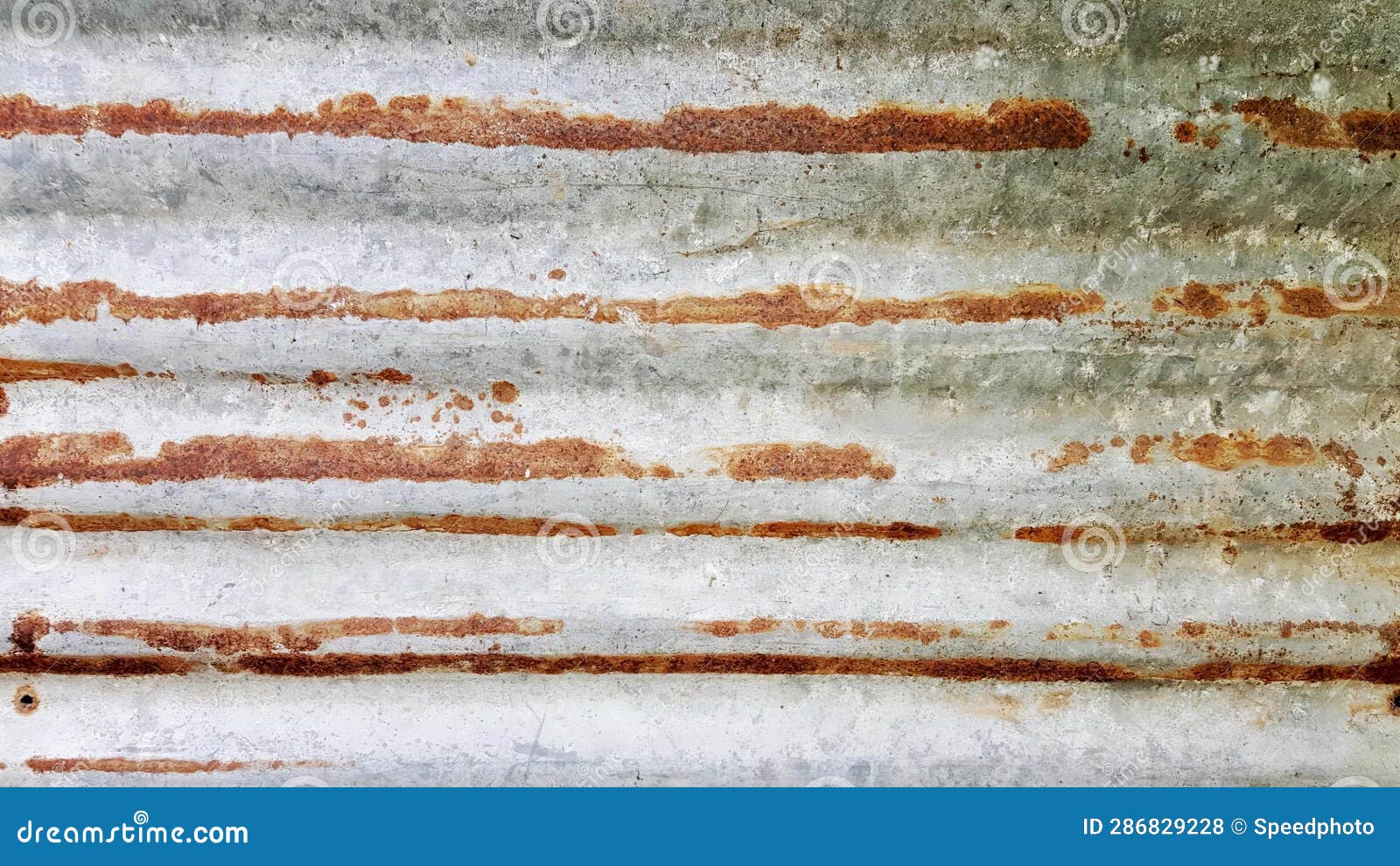 A Photography of a Rusty Surface with a Faded Pattern, Swoble of Rust ...