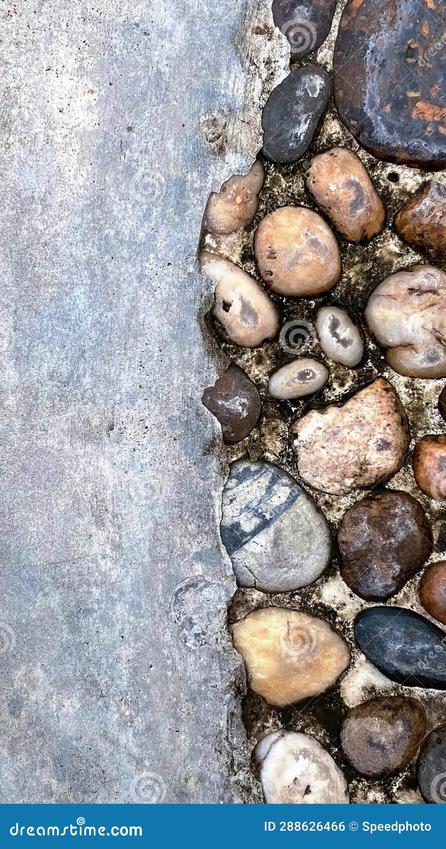 A Photography of a Stone and Metal Surface with a Few Rocks, Stone Wall ...