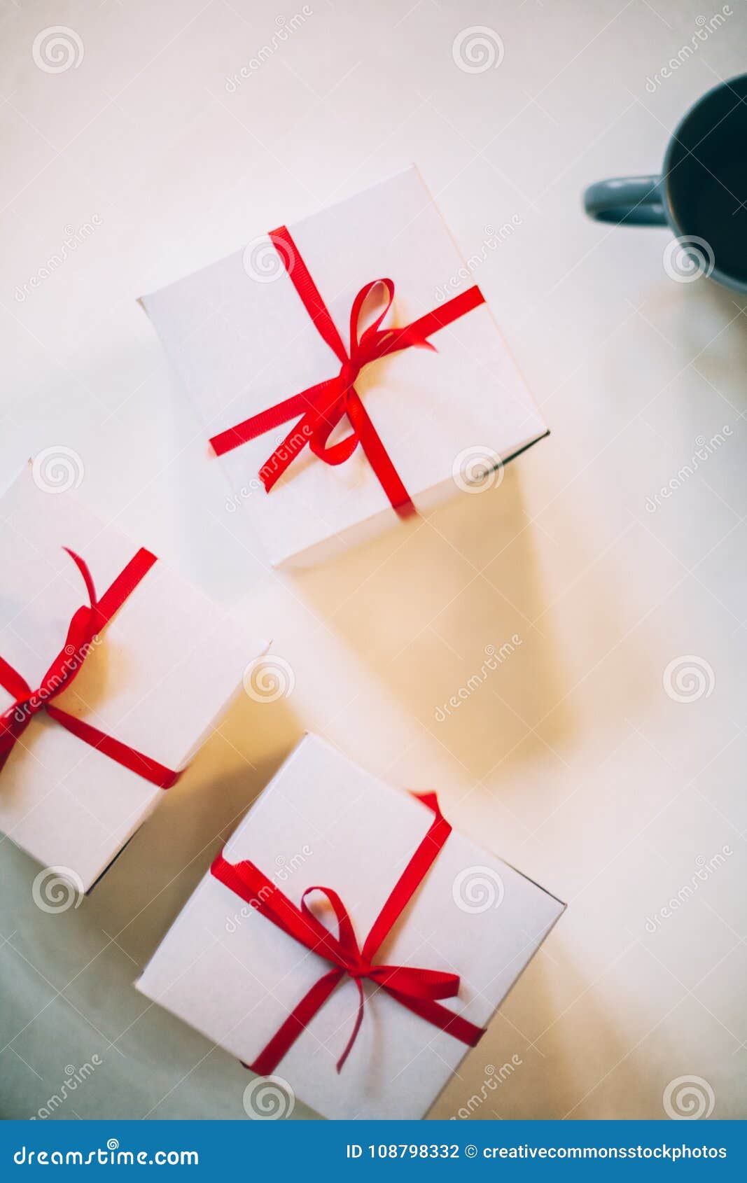 Photography Of Three Boxes With Red Ribbons Picture. Image: 108798332