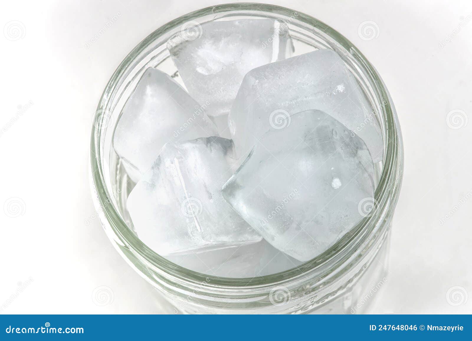 Jam pot with ice cubes stock photo. Image of cream, tableware - 247648046
