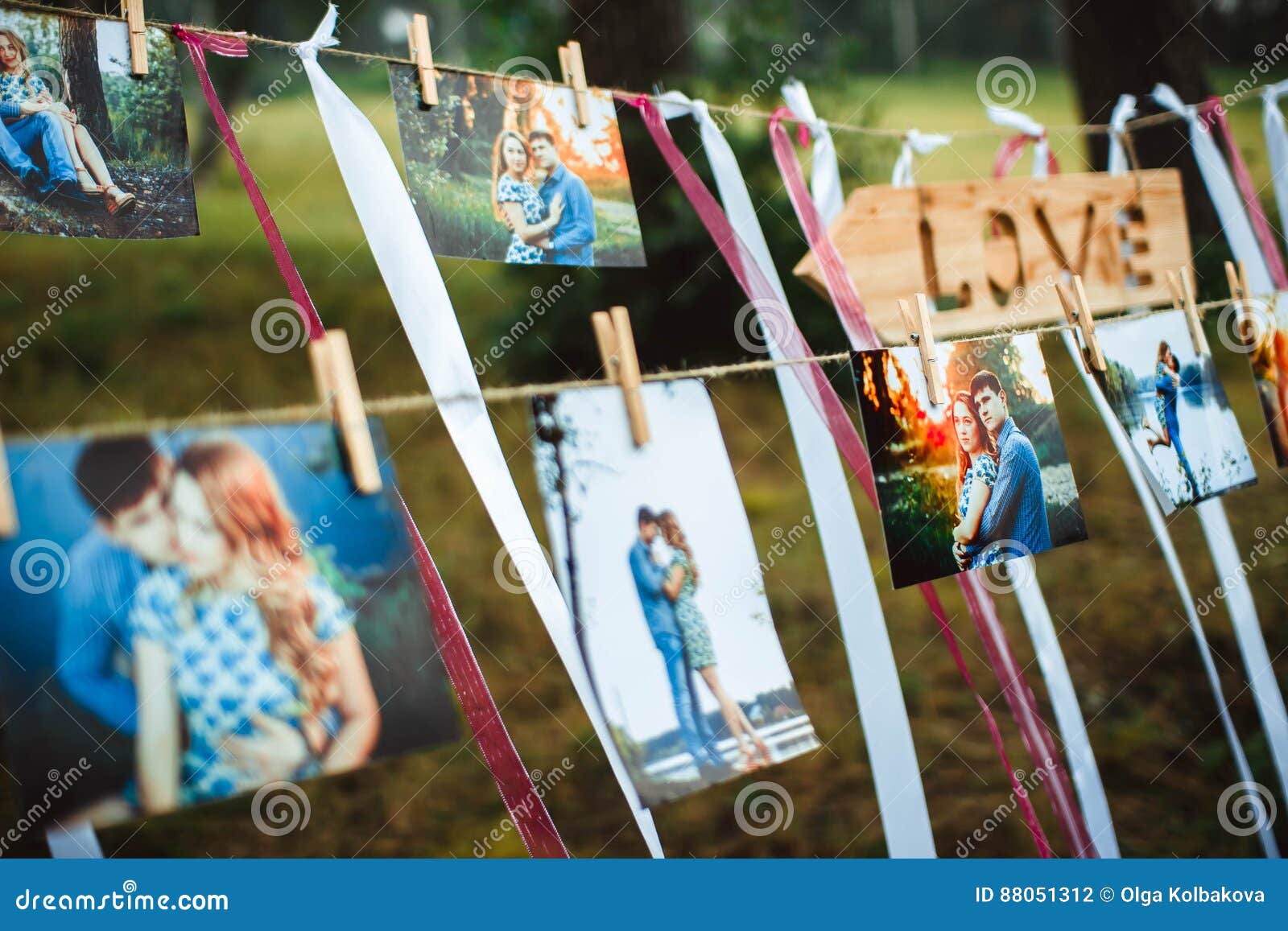 Photos hanging on a rope stock photo. Image of community - 88051312
