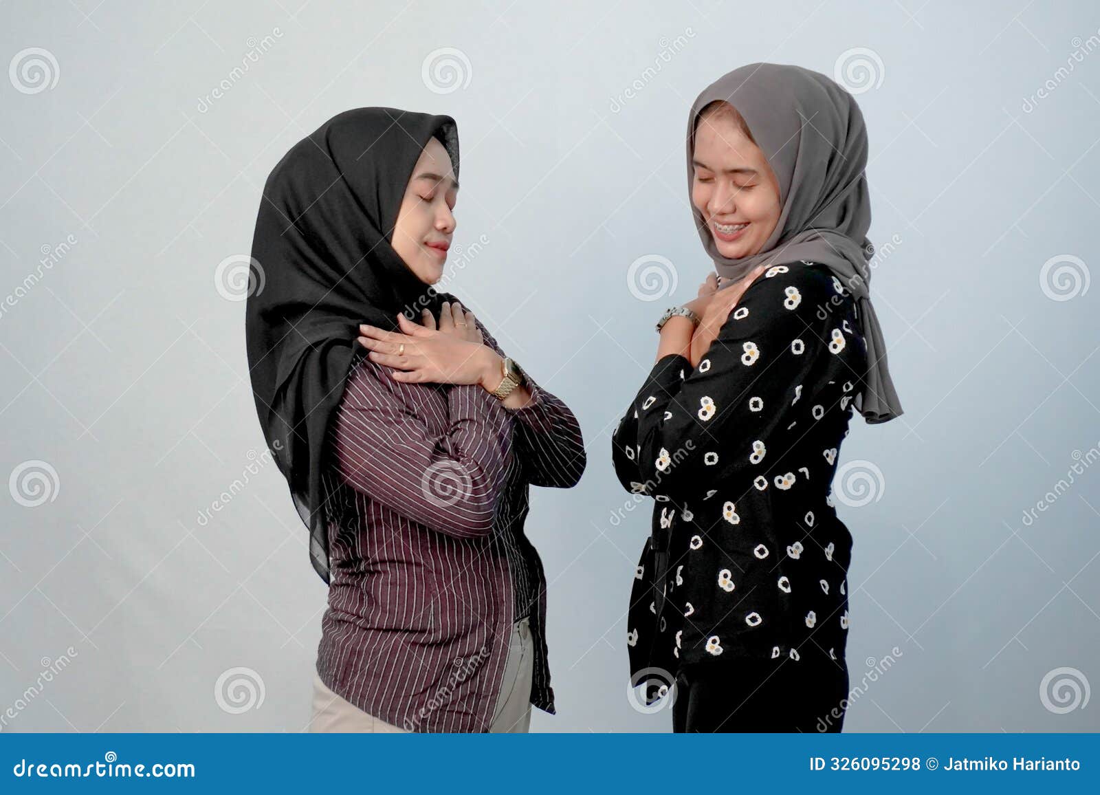 Two Indonesian Women Wearing Hijabs Wearing Regional Clothes from Java ...