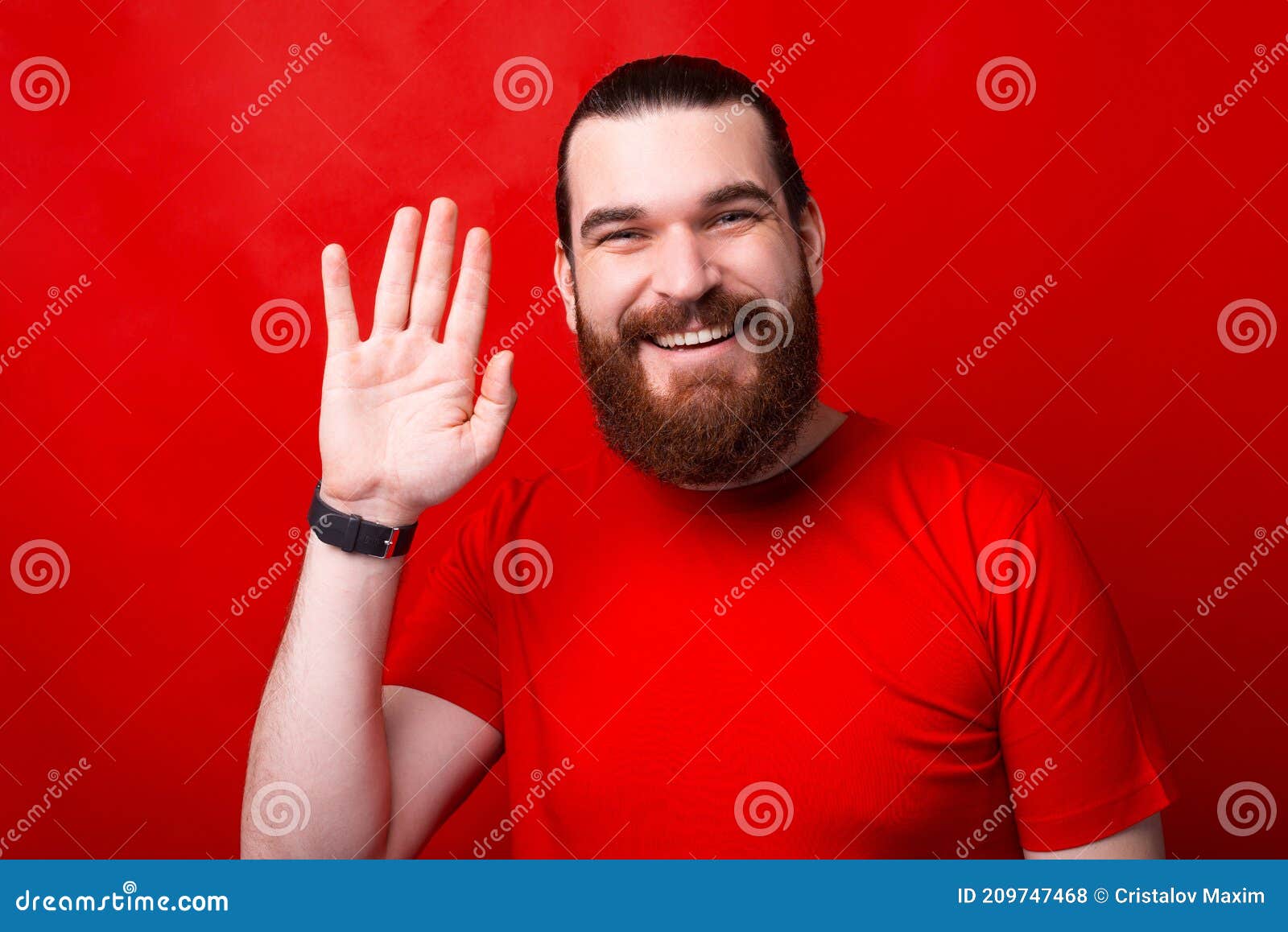 Photot of a Man Waving at the Camera and Smiling As a Hello Stock Photo ...