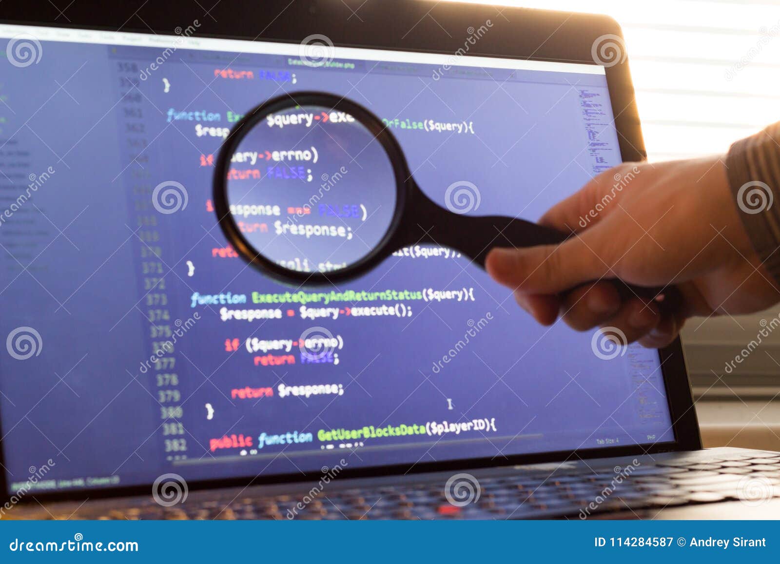 PHP Back-end Code Zoomed through a Magnifier. Computer Programming ...
