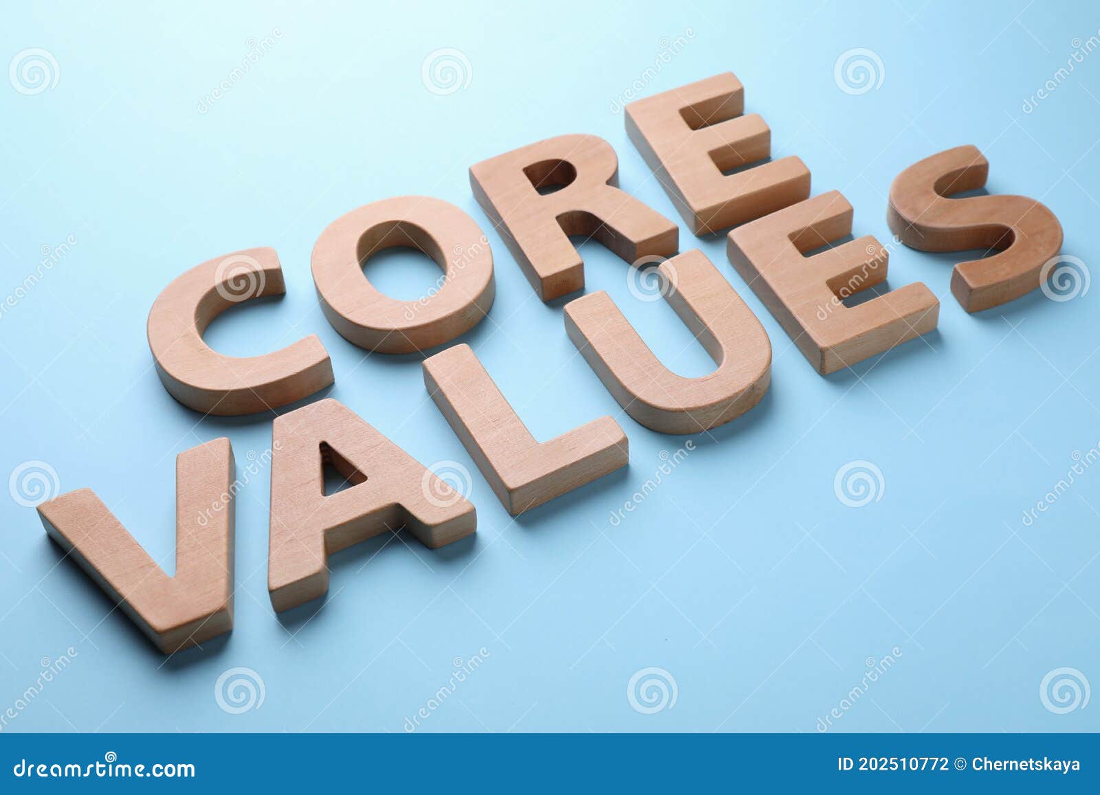 Phrase CORE VALUES Made of Wooden Letters on Light Blue Background ...