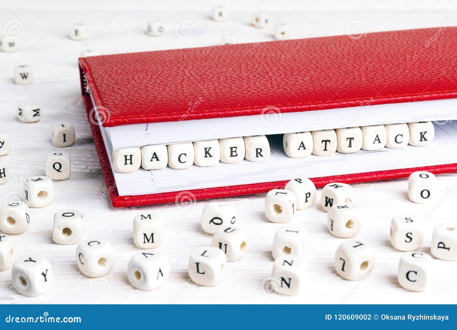 Phrase Hacker Attack Written in Wooden Blocks in Red Notebook on Stock ...