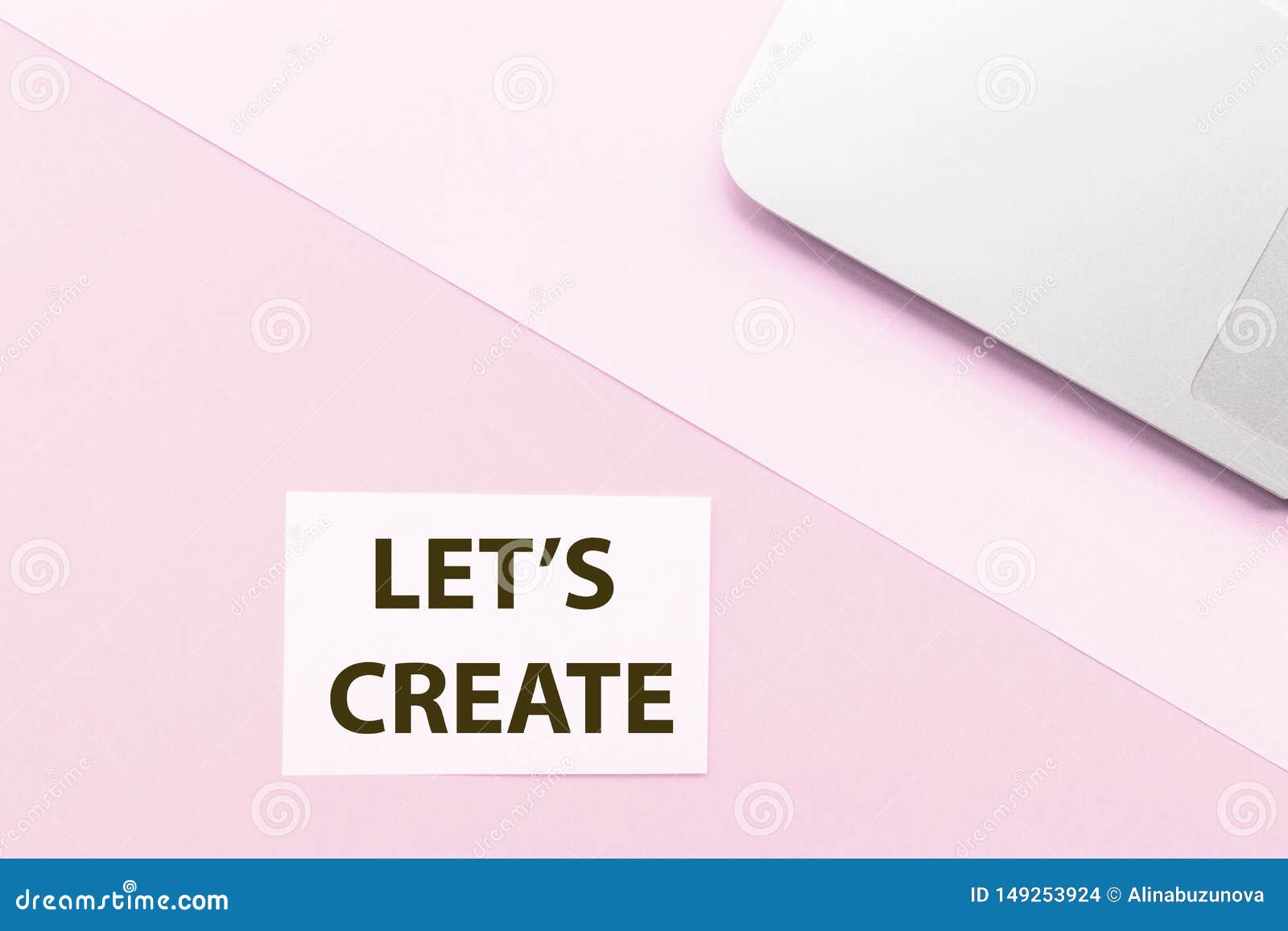 Phrase Let is Create and Laptop on Pink Background. Top View. Mockup ...