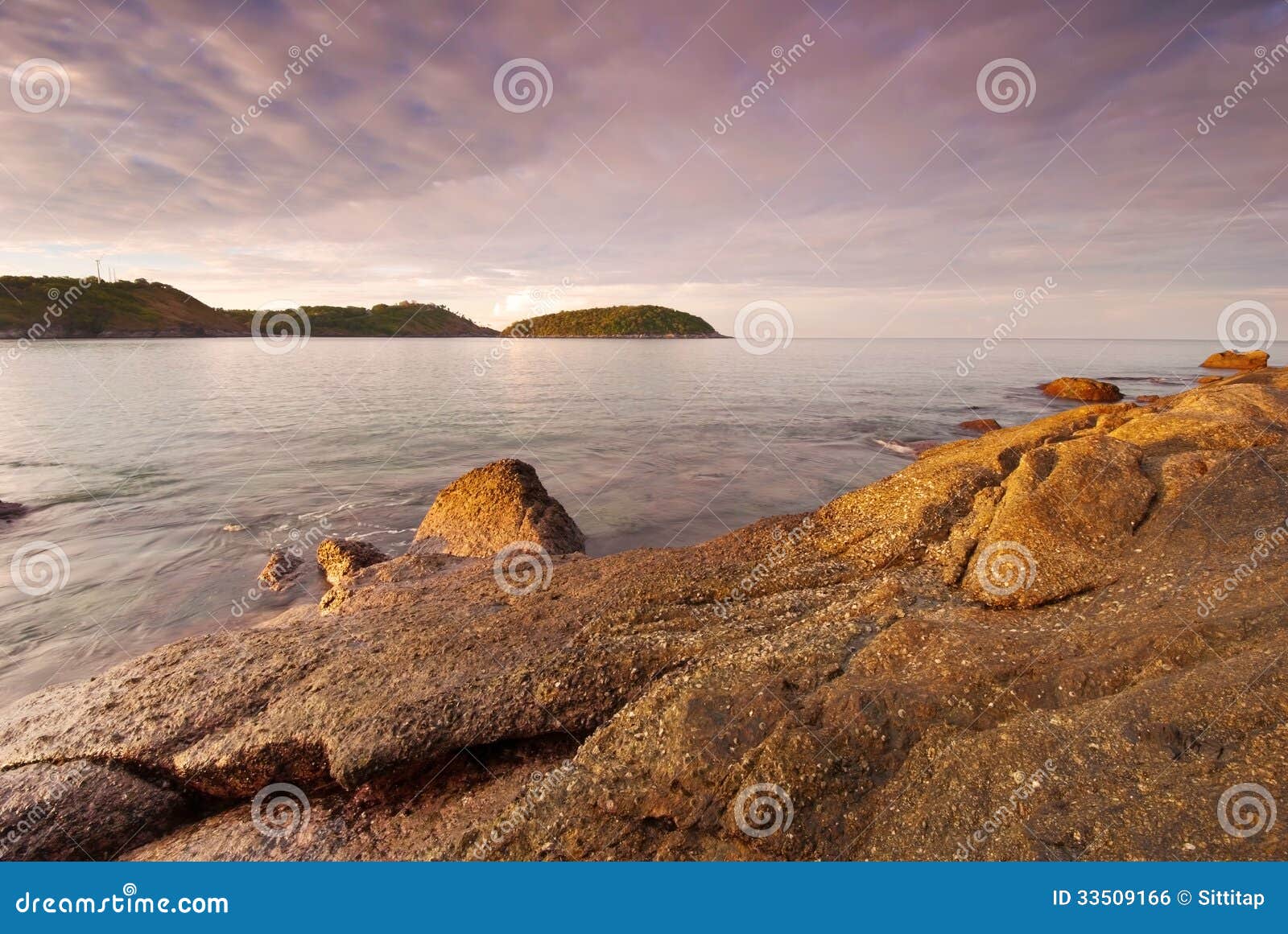 Phuket Beach at Sunrise with Interesting Rocks in Foreground Stock ...