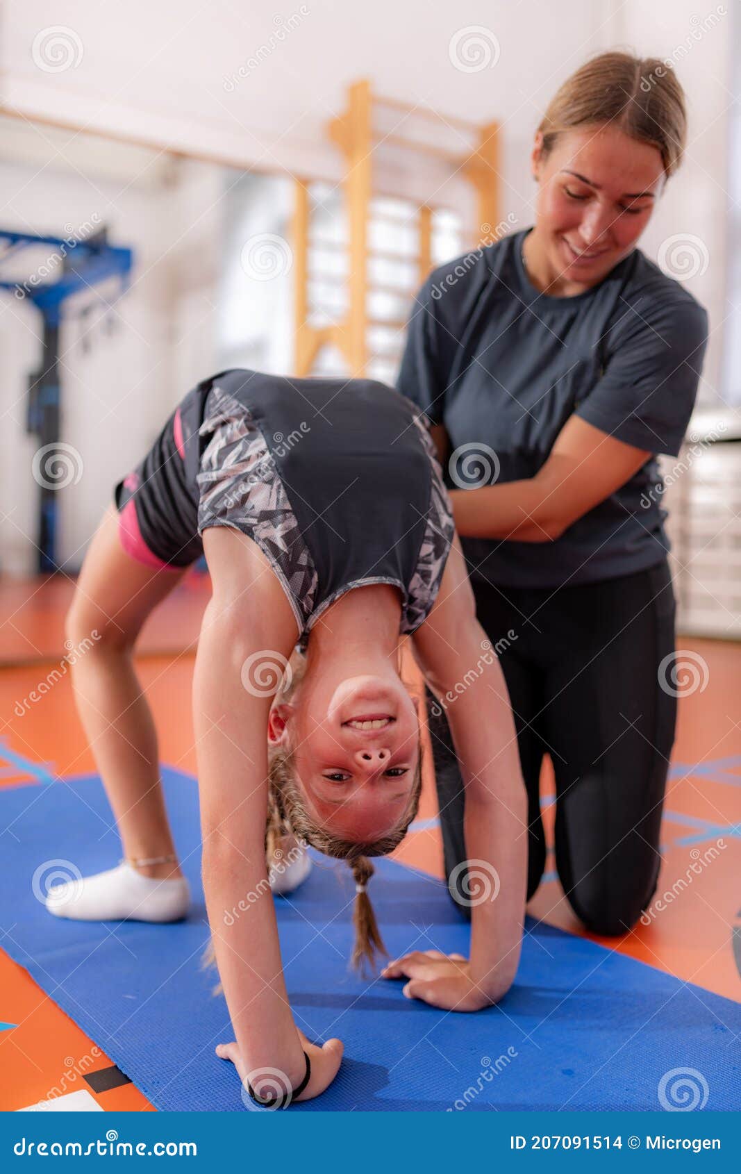 Physical Activity for Kids, Child Doing a Bridge with a Trainer, Core ...