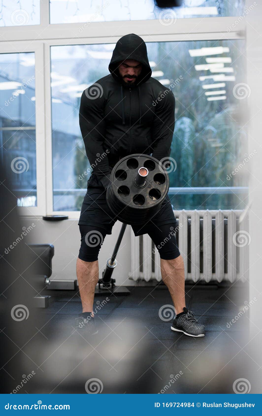 Physical Development of Young Strong Man Pulling Heavy Weight Barbell ...