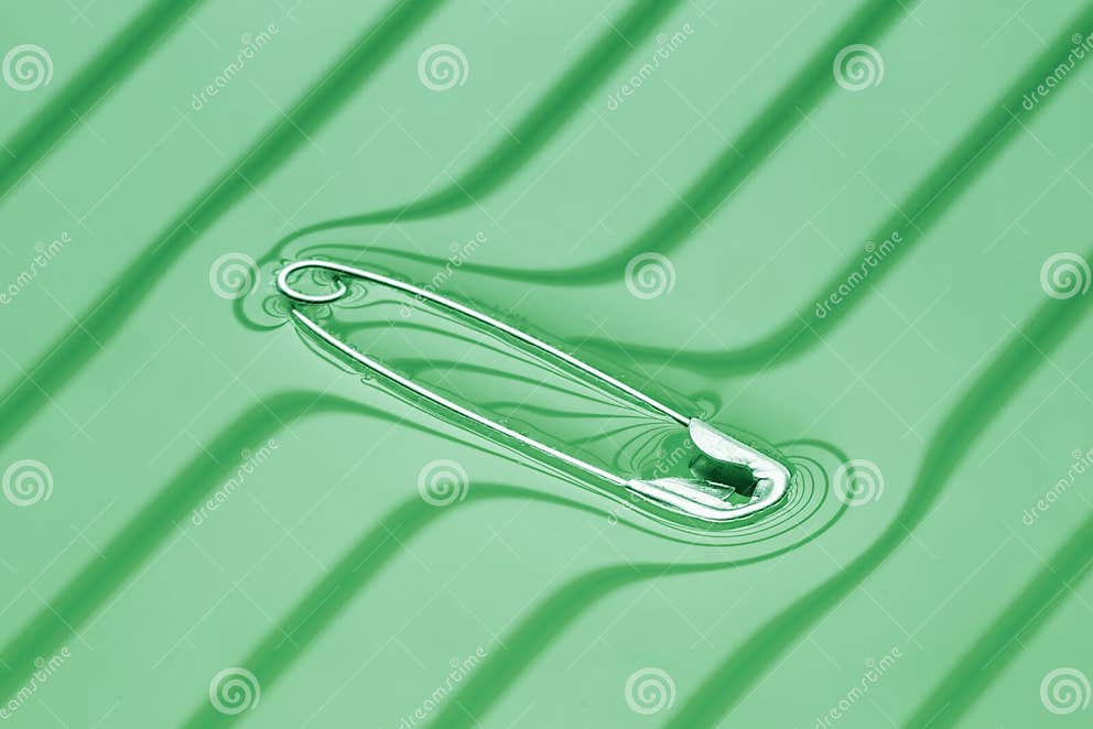 Physical Experiment - Pin Floating on Water Surface Stock Photo - Image ...