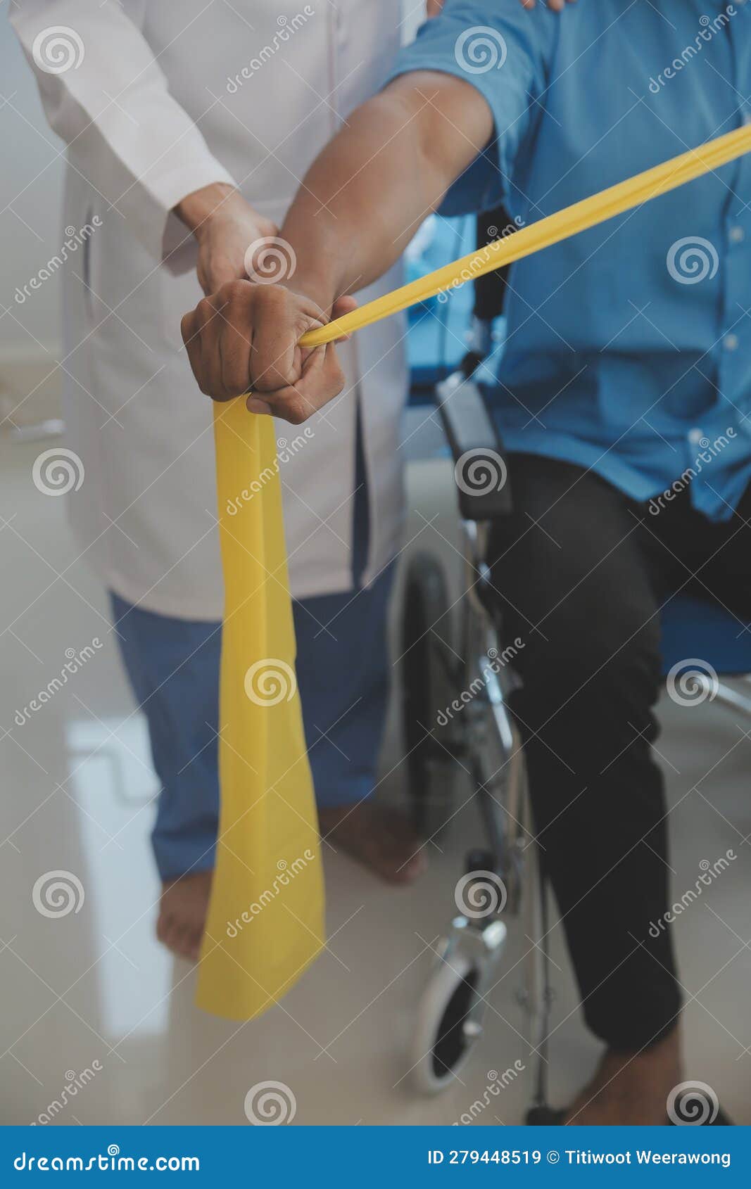 Physical Therapist Guiding Patient with Resistance Band Stock Image ...