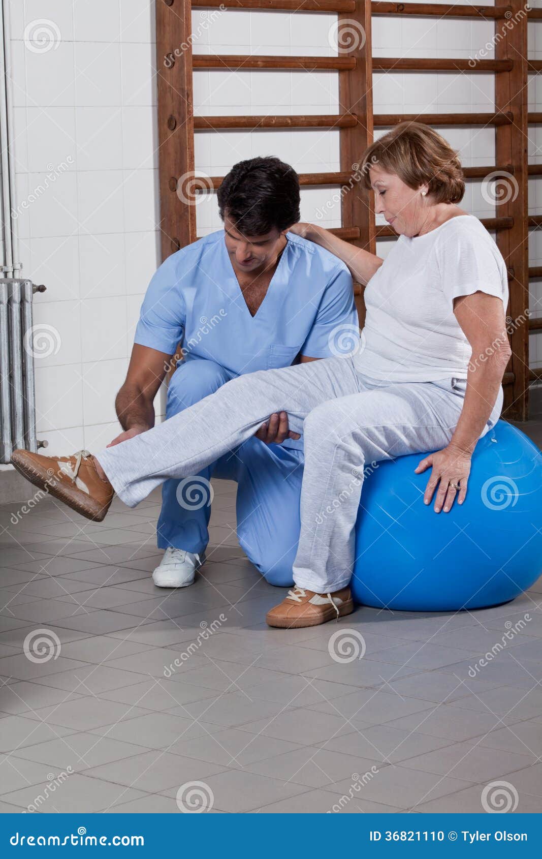 Physical Therapist Helping a Patient Stock Photo - Image of people ...