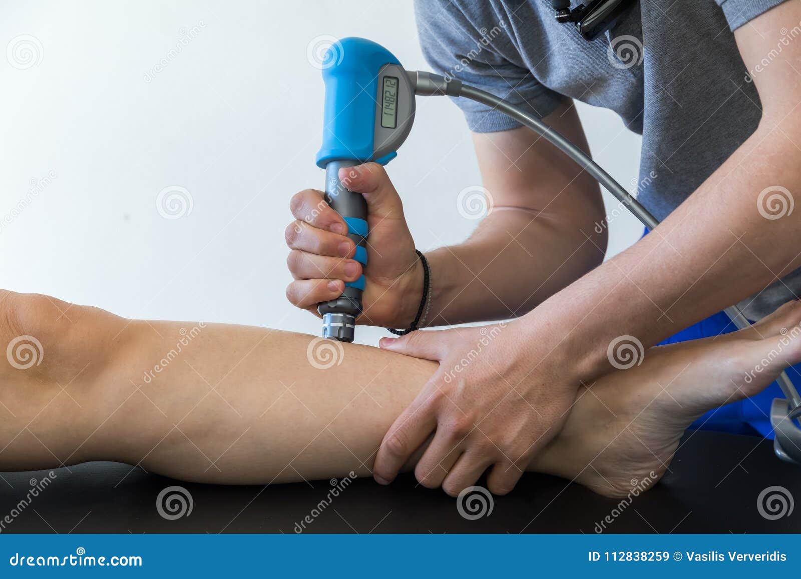 Physical Therapy of the Knee and the Foot with Shock Wave Stock Image ...