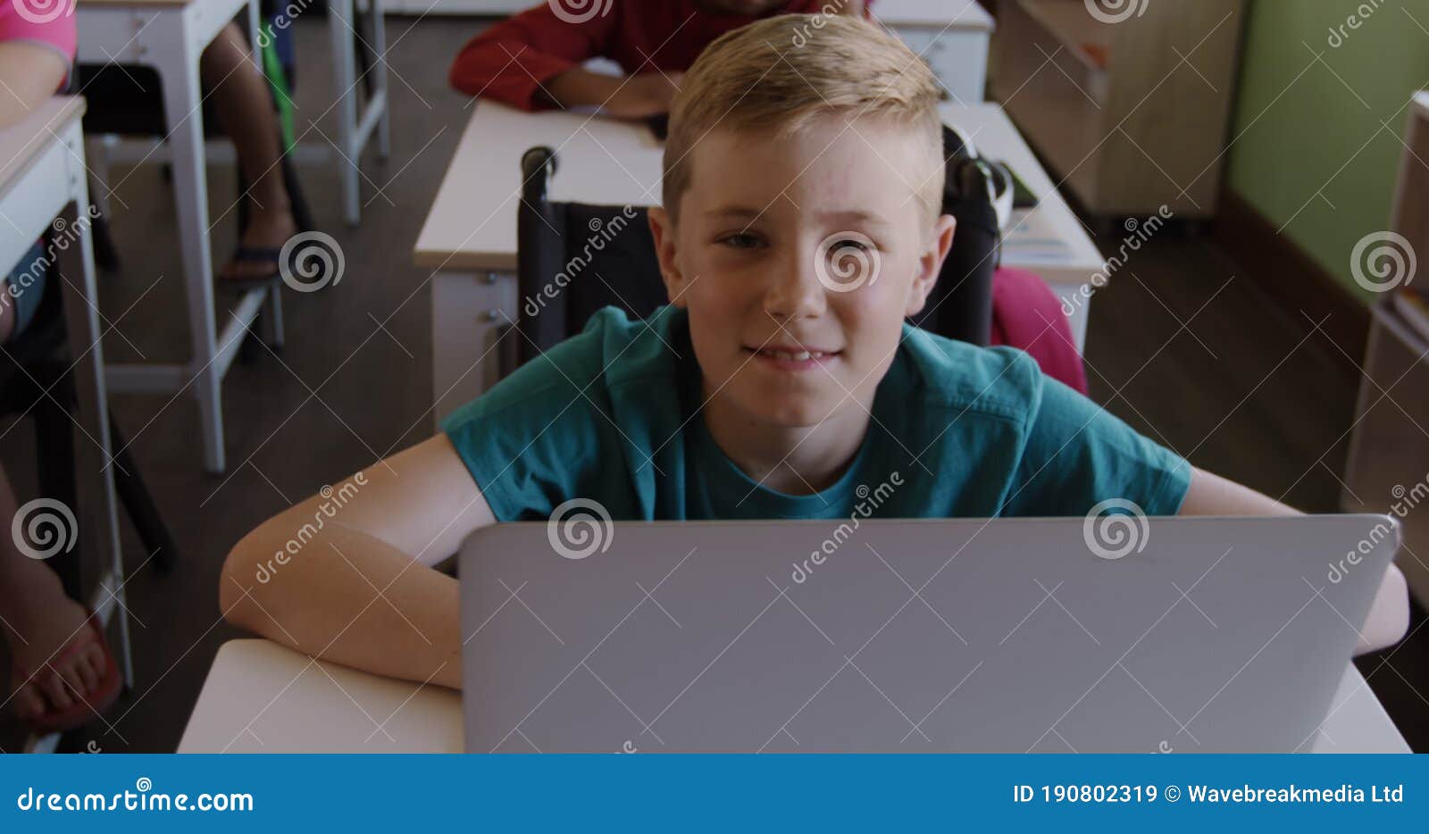 Physically Challenged Boy Using Laptop in the Class Stock Video - Video ...