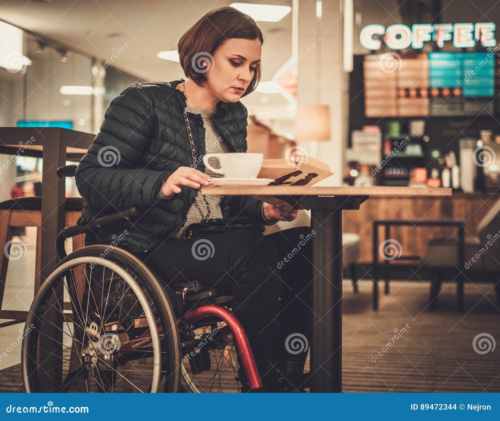 Physically Challenged Women in a Cafe Stock Photo - Image of disable ...