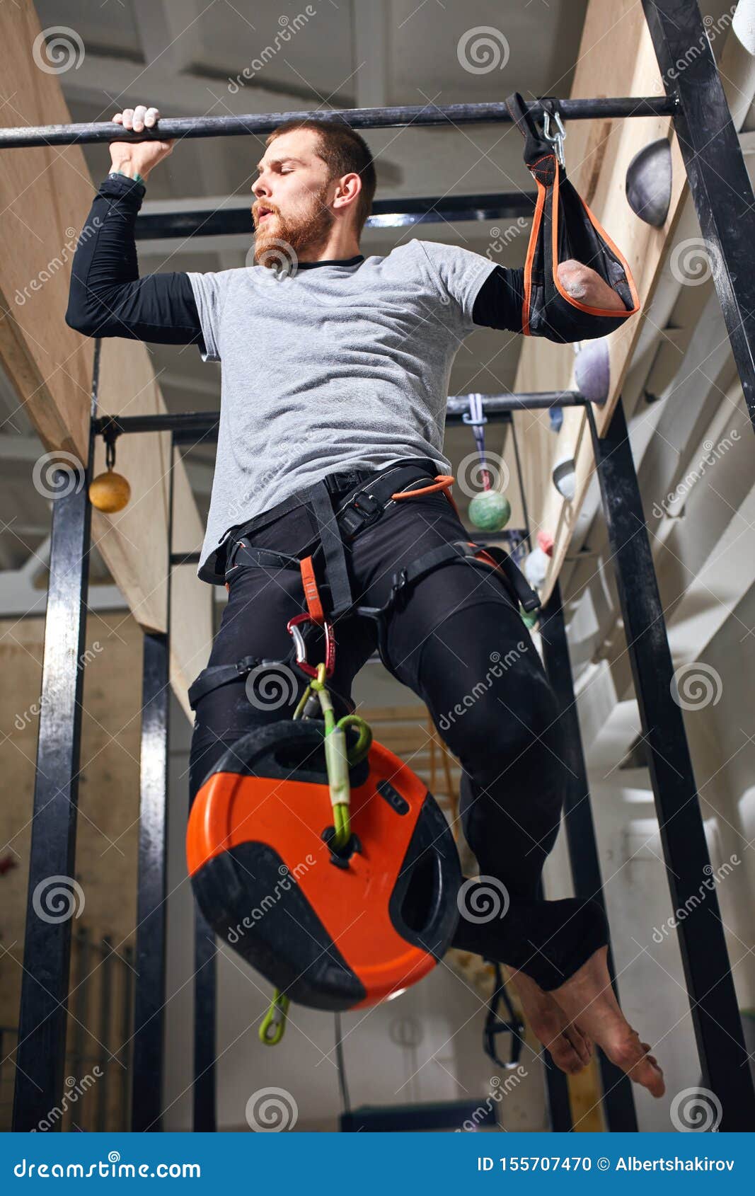 Ambitious Physically Challenged Boulderer Climbing Artificial Rock Wall ...