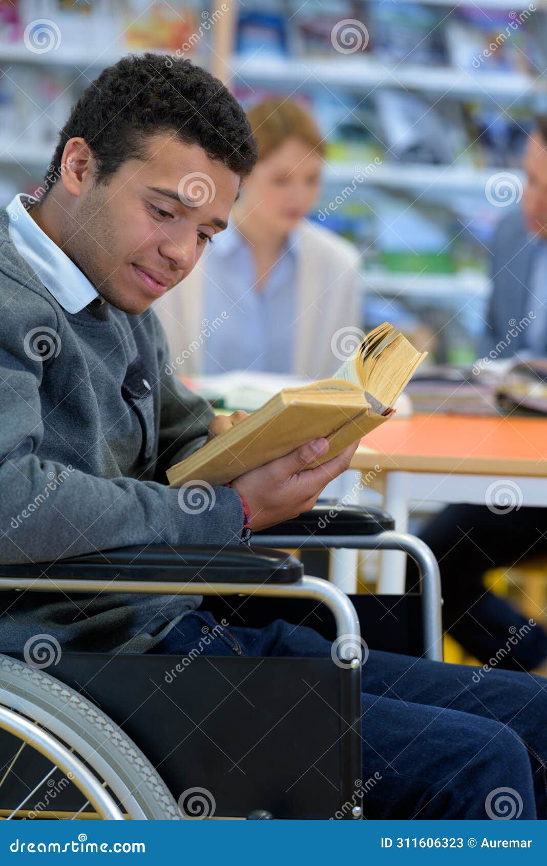 Physically Handicapped Man on Wheelchair with Books Stock Image - Image ...