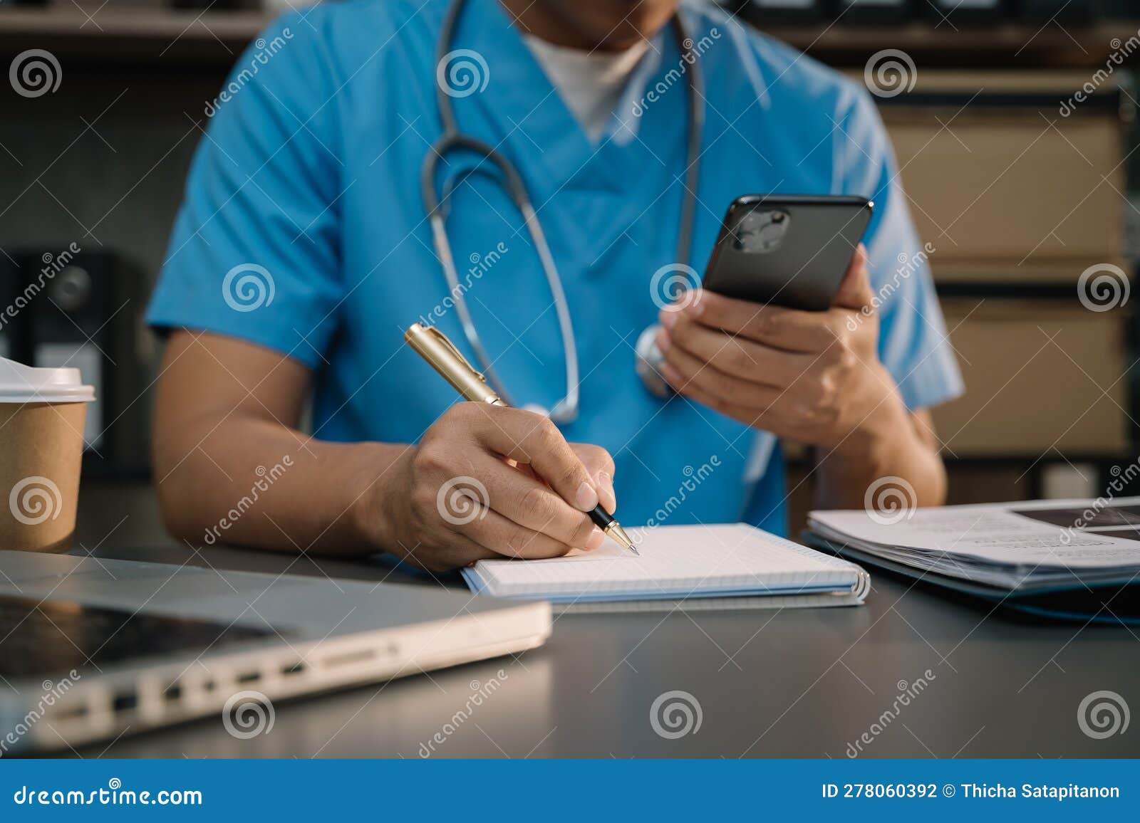 Practitioner In Lab Room Writing On Blank Notebook And Work On Tablet ...