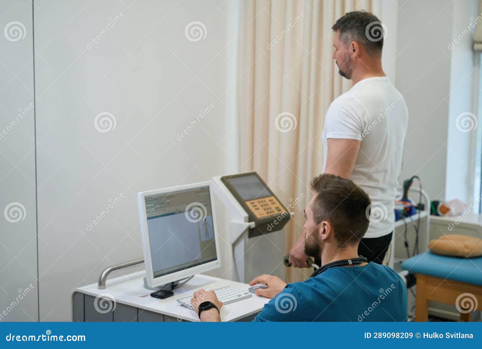 Doctor Analyzing Monitor Readings during BCA Procedure in Adult Man ...