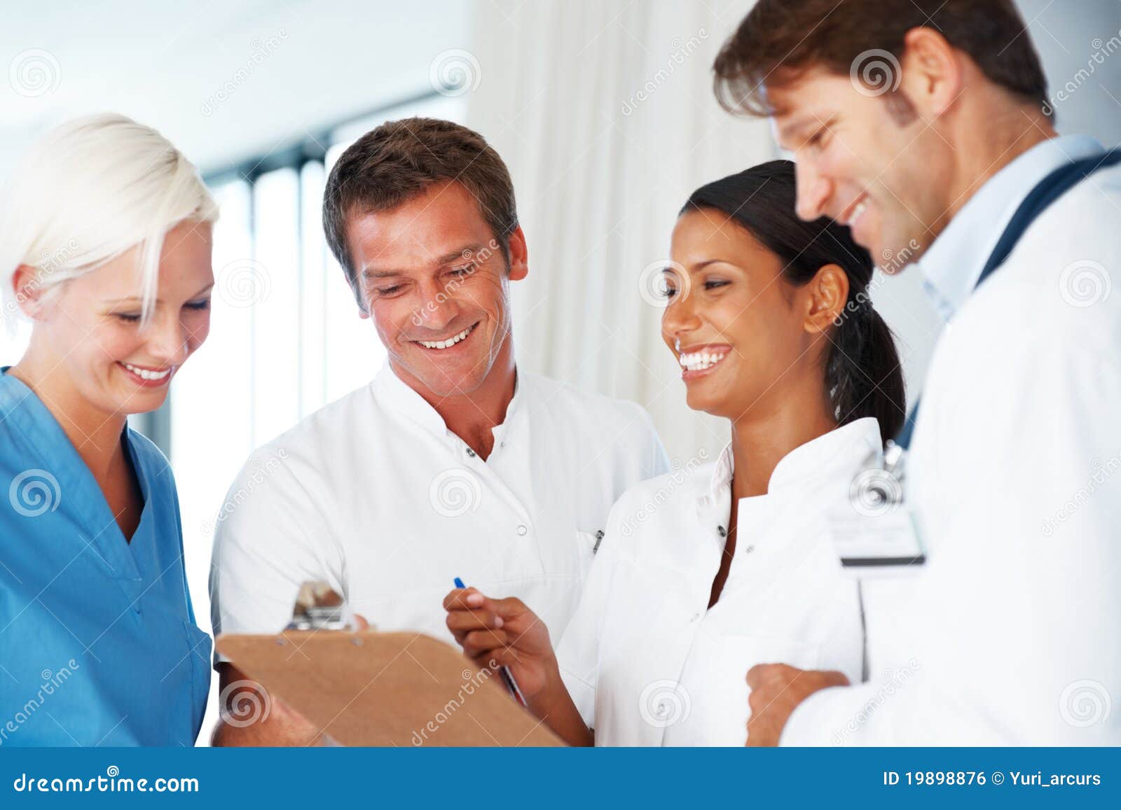Physicians Discussing on Medical Report Stock Photo - Image of clinic ...