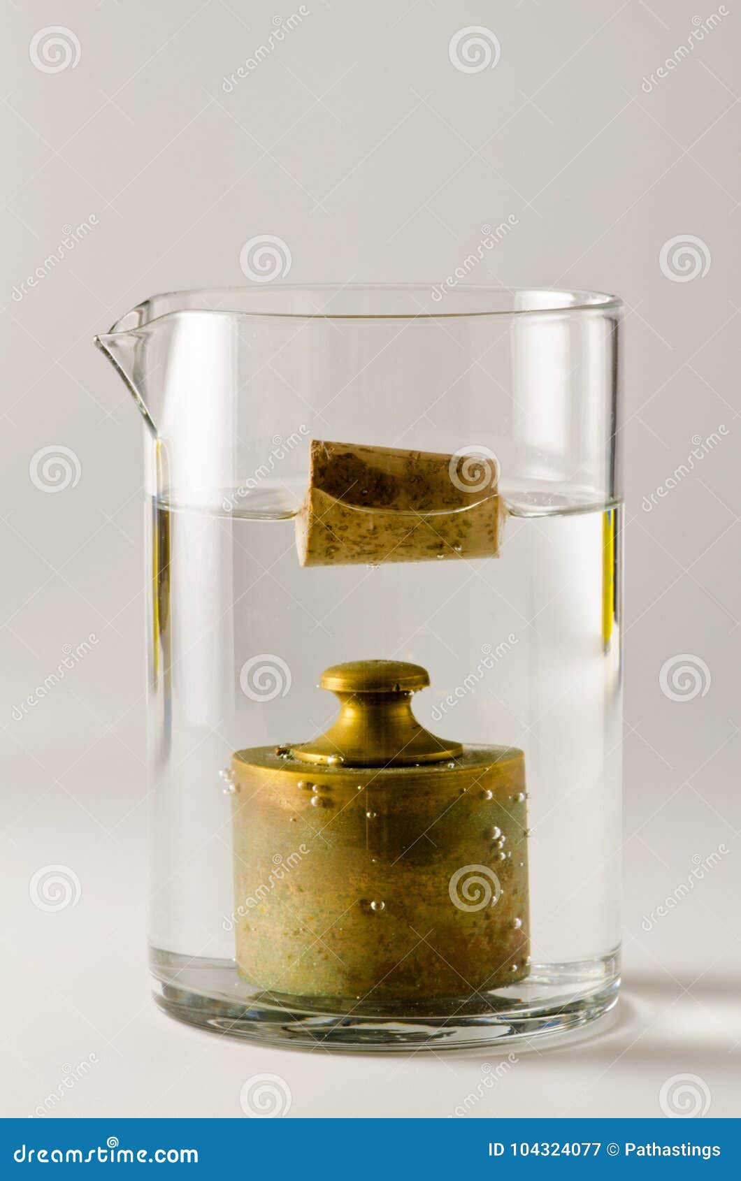 Physics. Heavy And Light Objects In Water. Royalty-Free Stock ...