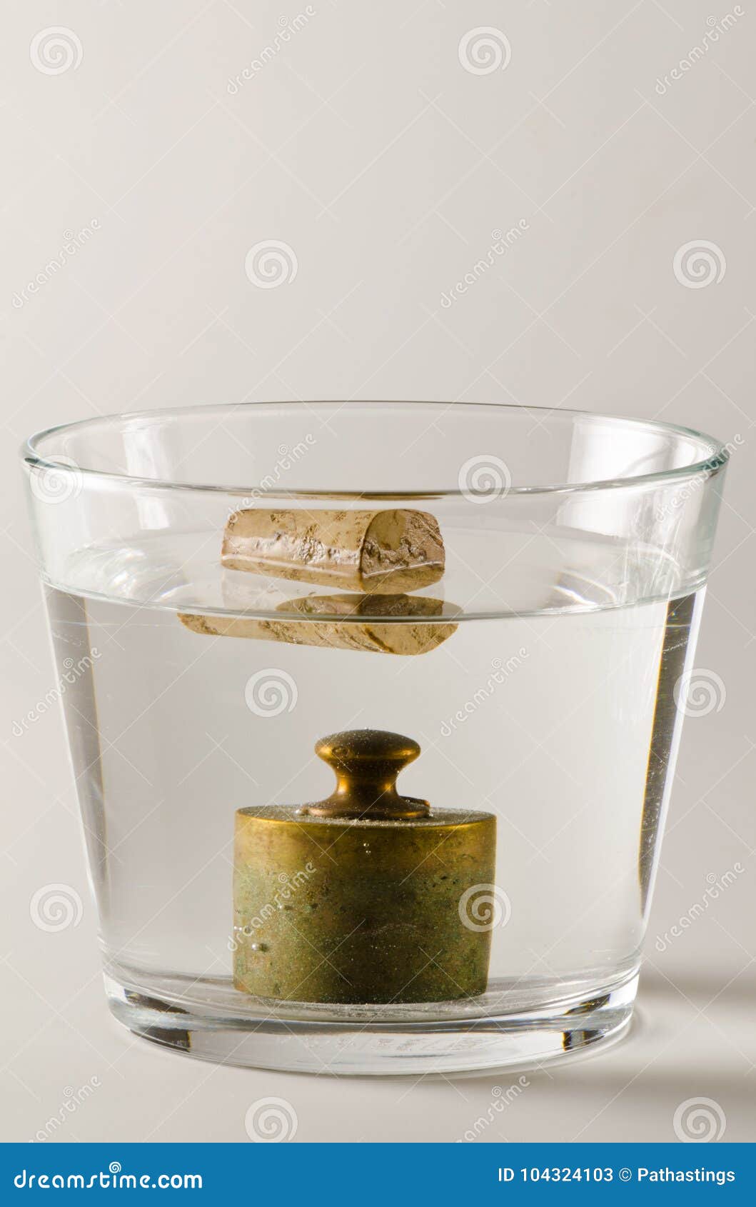 Physics. Heavy And Light Objects In Water. Royalty-Free Stock ...