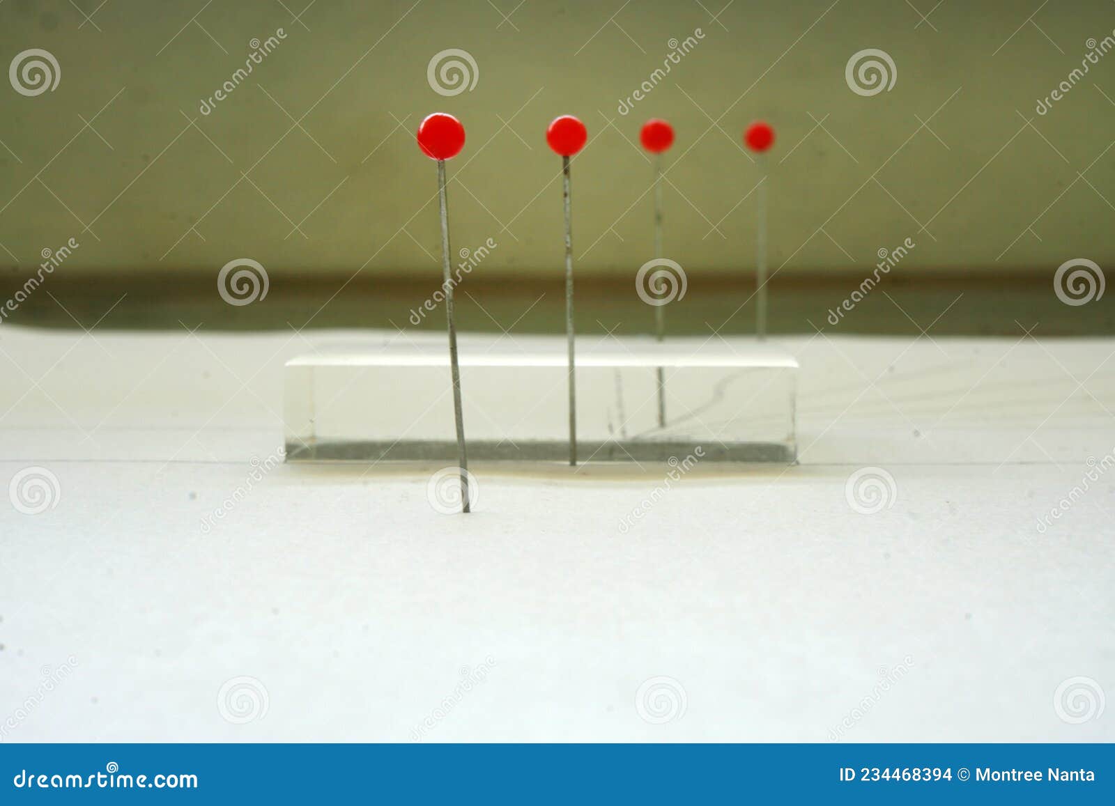 Pins are Placed in Front of and Behind a Square Glass Rod To Study the ...