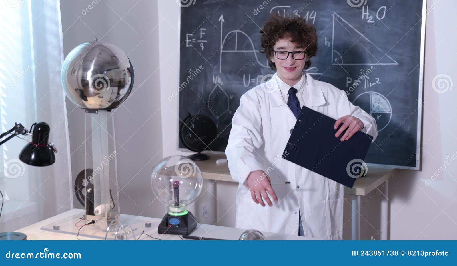 Physics Science Lab: Handsome Young Scientist in White Coat and Glasses ...