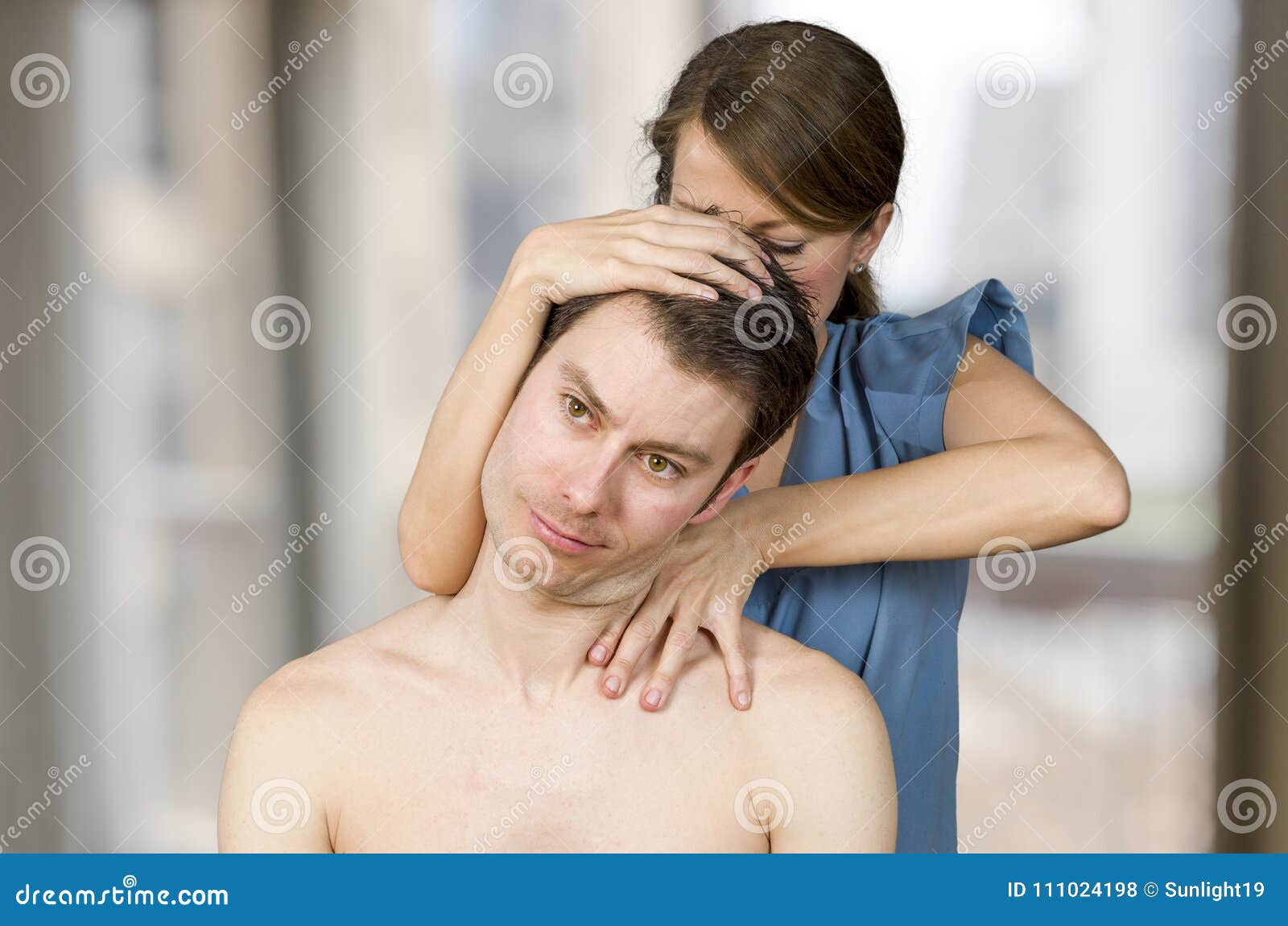 Physiotherapist, Chiropractor Doing Cervical Manipulation with a Stock ...