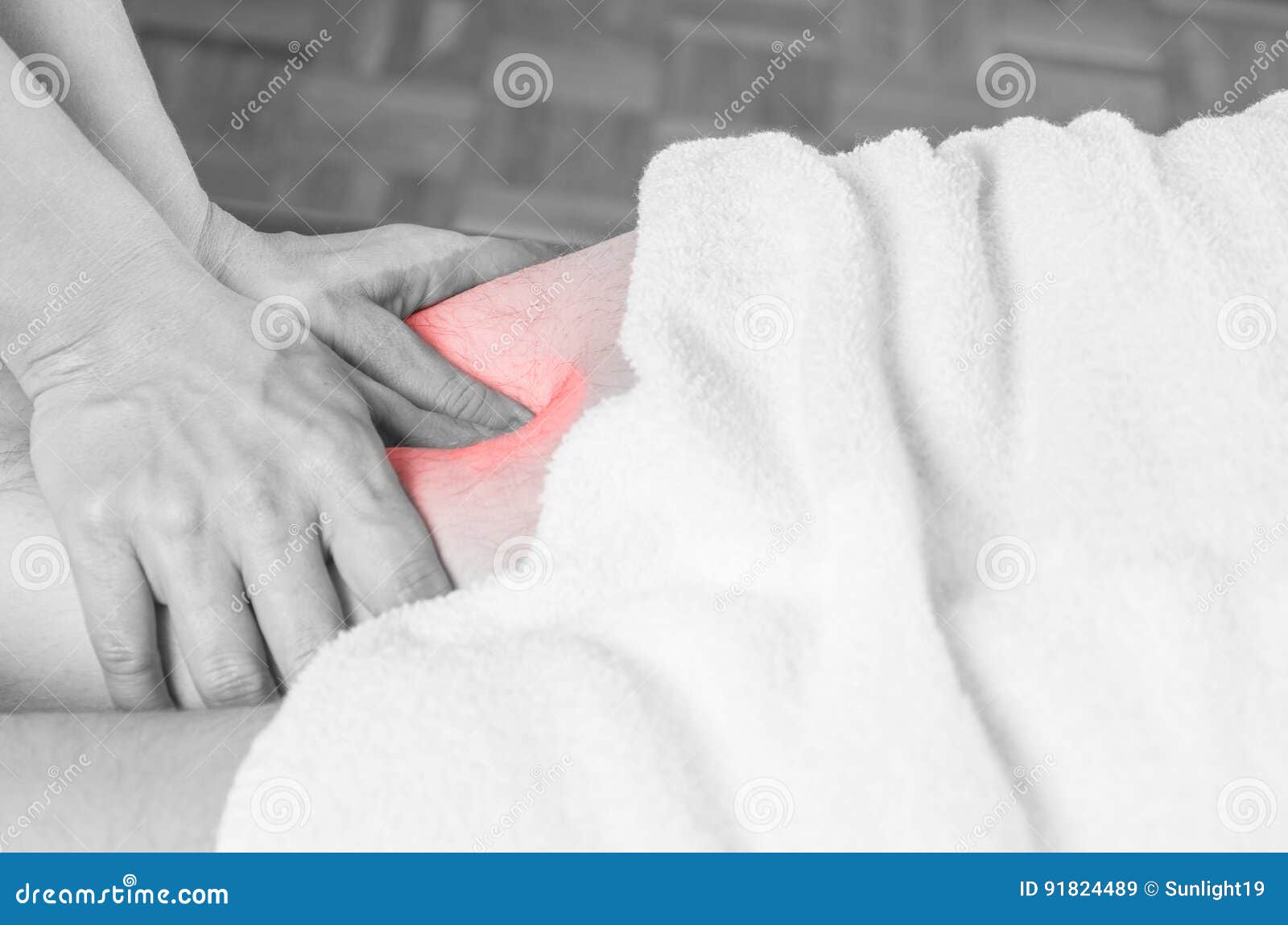 Physiotherapist Doing a Hamstrings Massage To Man Patient in Wh Stock ...