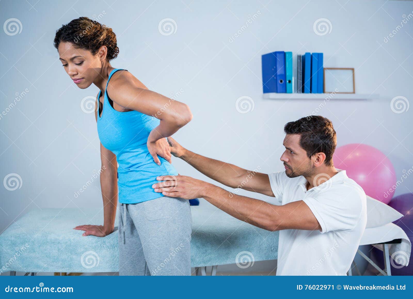 Physiotherapist Examining Womans Back Stock Image - Image of ...