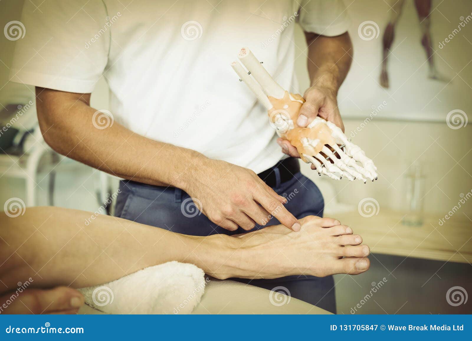 Physiotherapist Explaining Feet Model To Patient Stock Image - Image of ...
