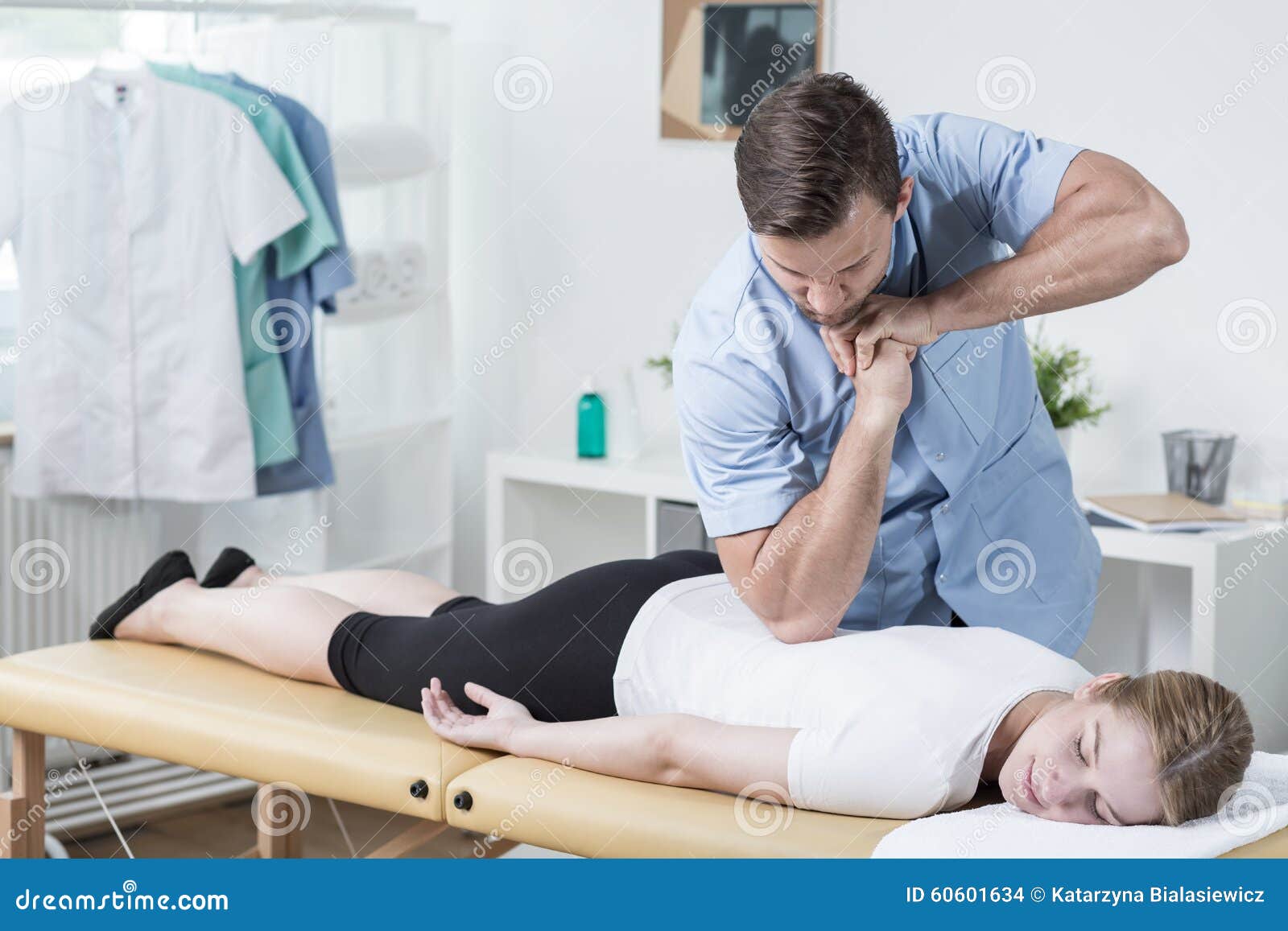 Physiotherapist Massaging Womans Back Stock Photo - Image of clinic ...