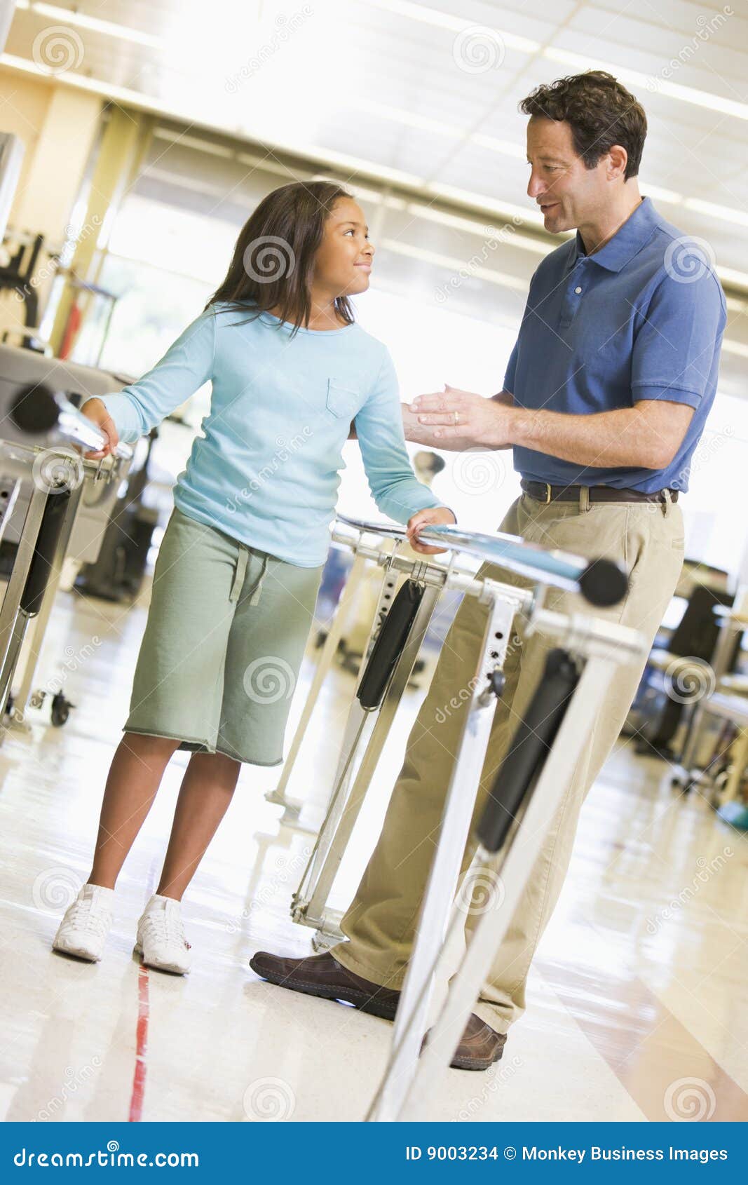 Physiotherapist with Patient in Rehabilitation Stock Photo - Image of ...